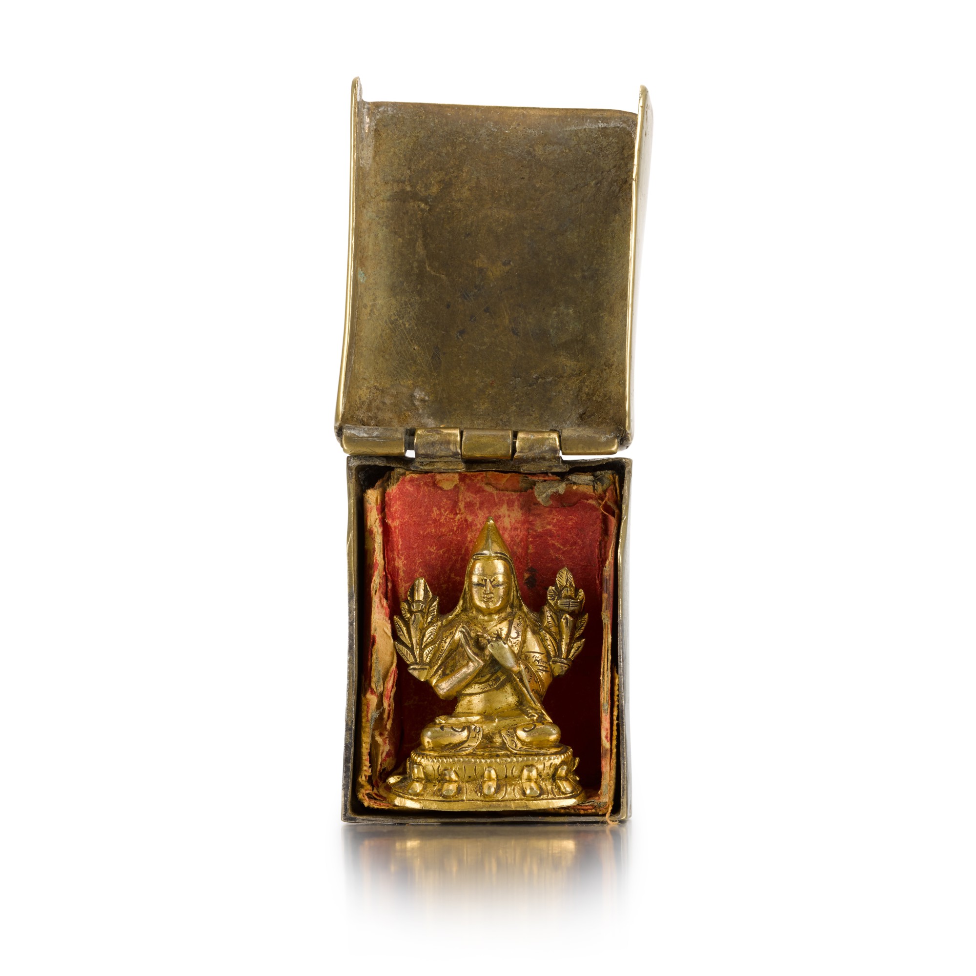 A miniature Sino-Tibetan gilt-bronze figure of a lama, box 18th century ...
