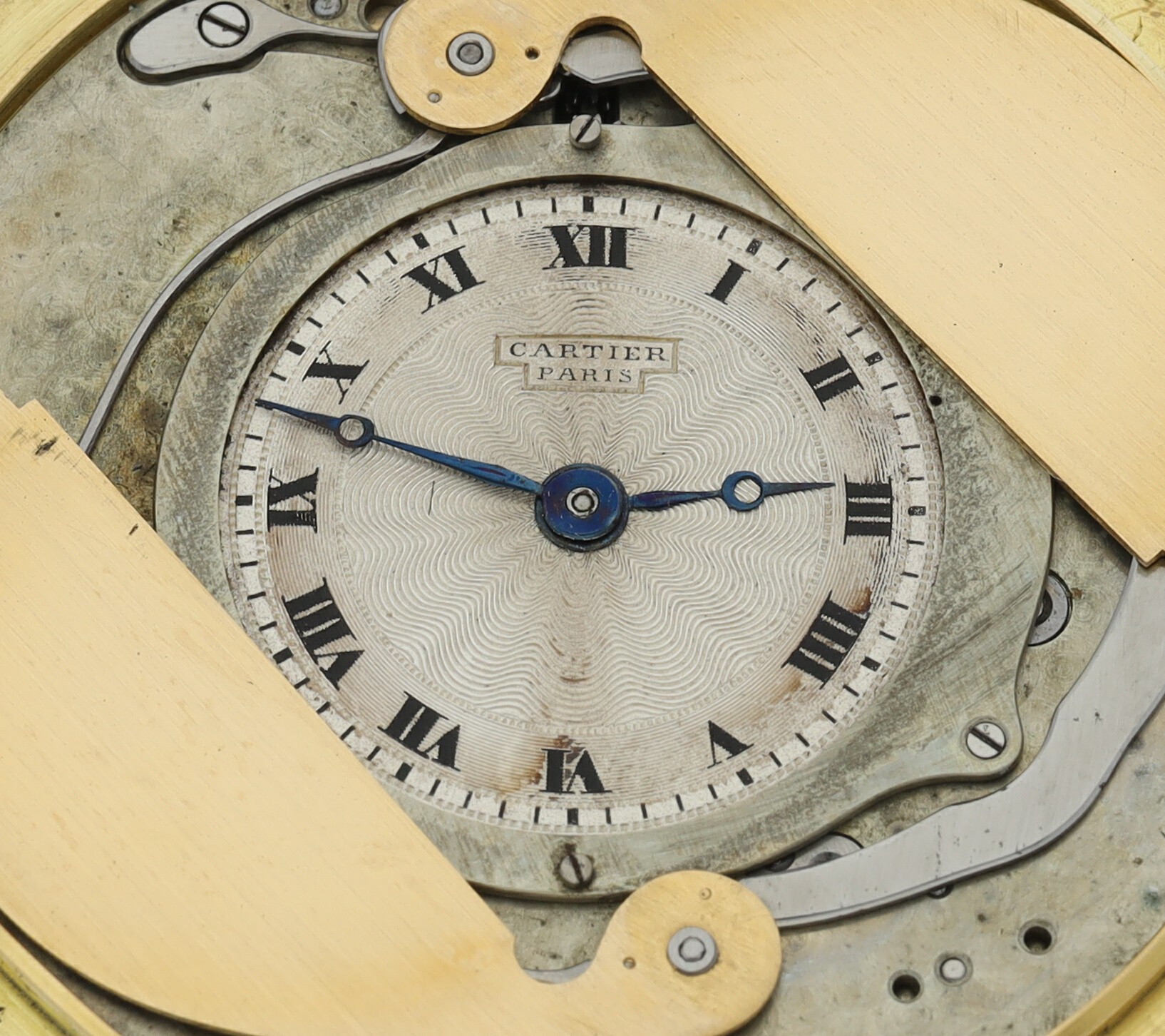 CARTIER, PARIS | A YELLOW GOLD WATCH WITH CONCEALED GUILLOTINE DIAL ...