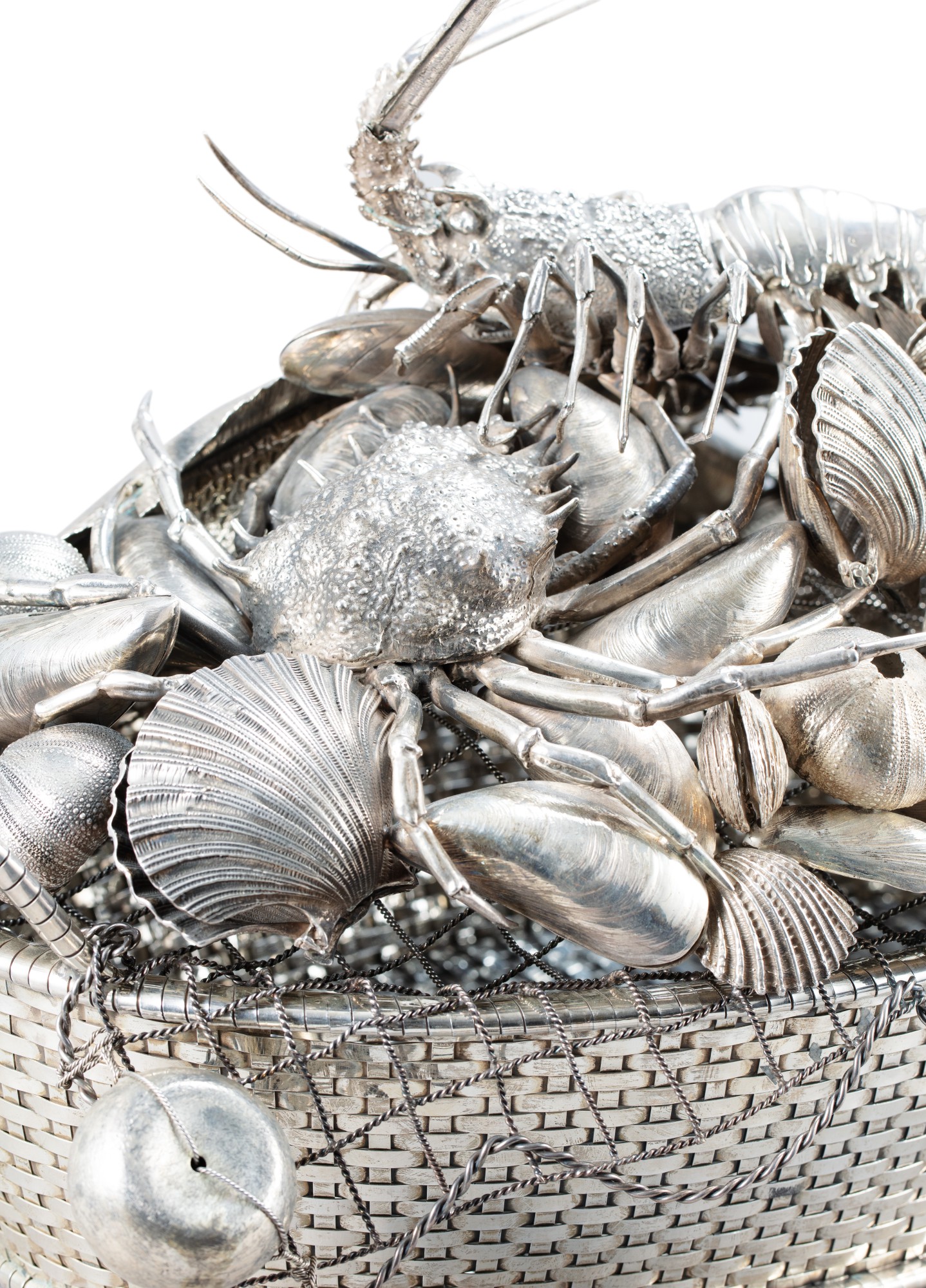 A large Italian silver centretable shaped as a fishing basket, Mario ...