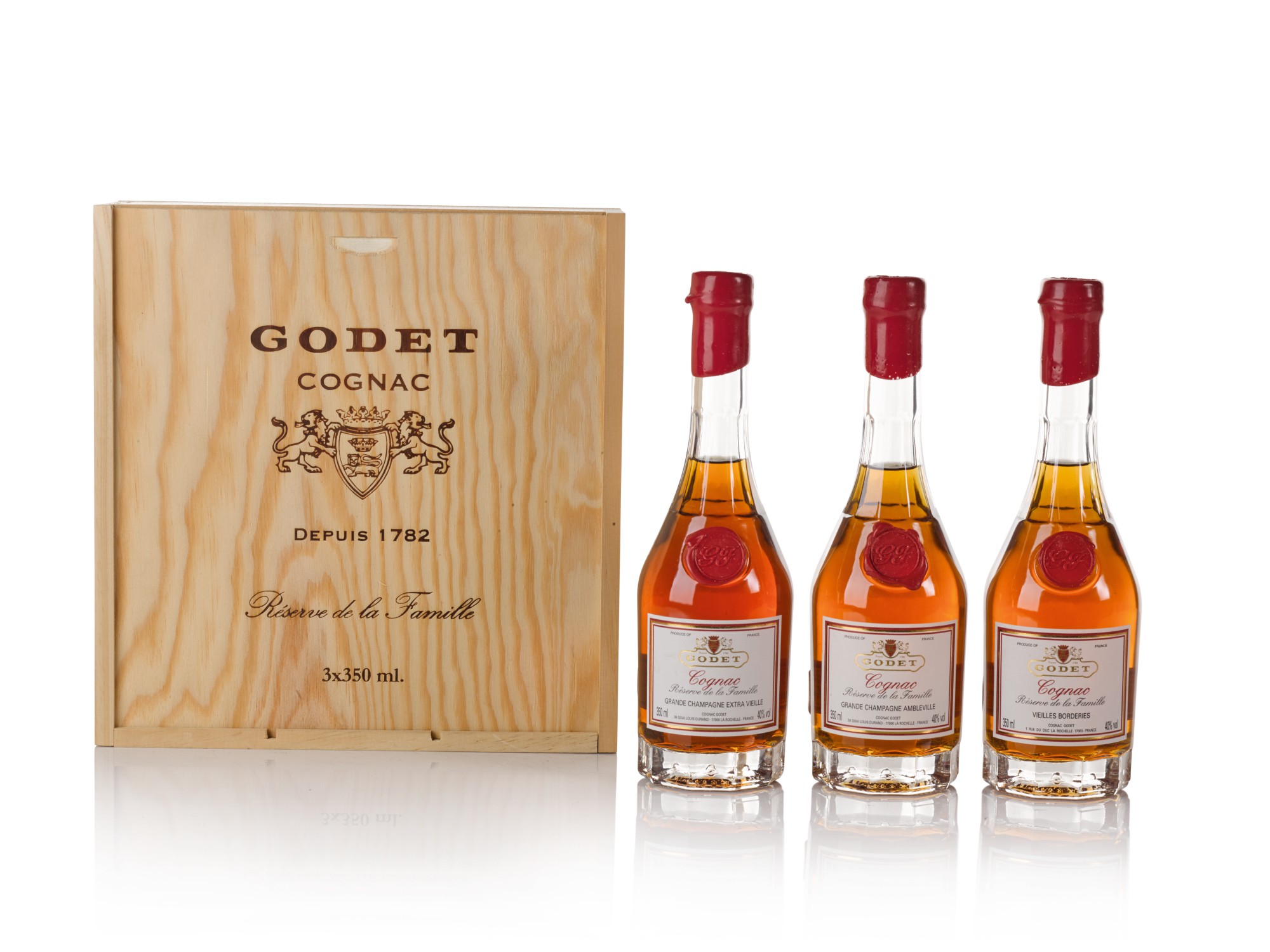 A three bottle mixed case of Godet Cognac | Distilled | Iconic Samaroli ...