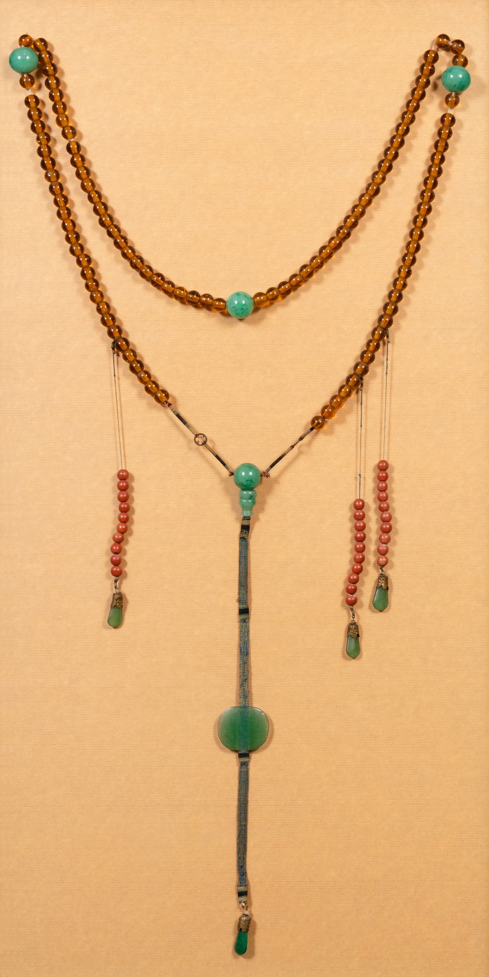 An amber and jadeite court necklace, chao zhu Qing dynasty, 19th ...