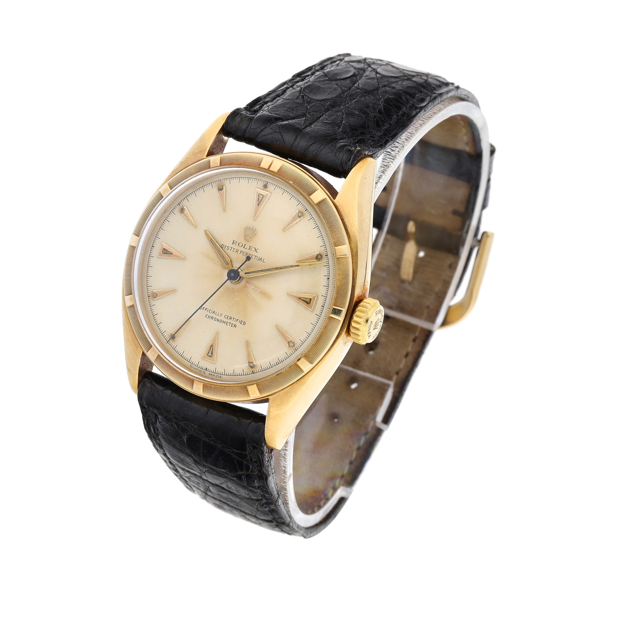 Rolex | Oyster Perpetual, Reference 6085, A yellow gold wristwatch ...