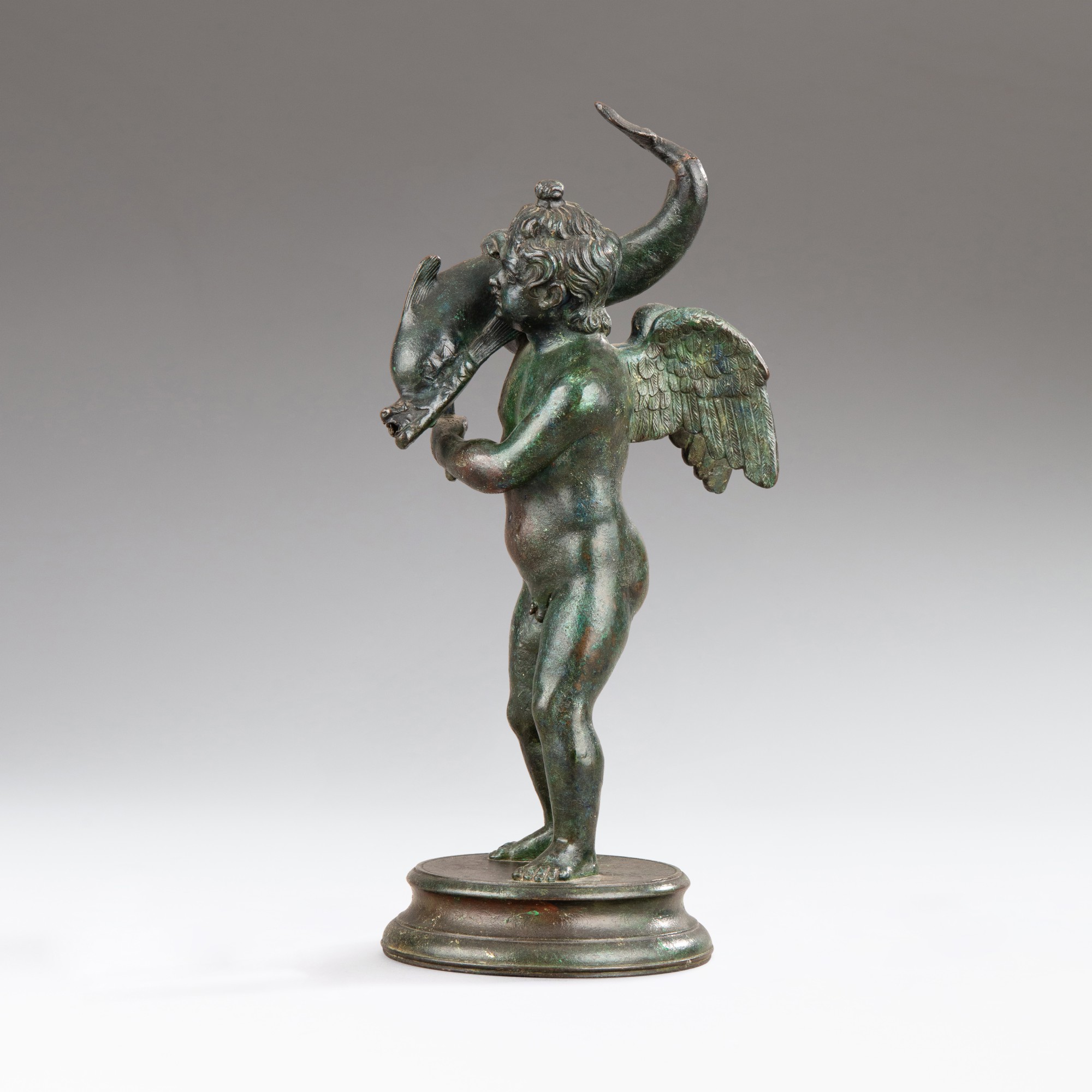 Cupid carrying a dolphin on his shoulder | Cupidon portant un dauphin ...