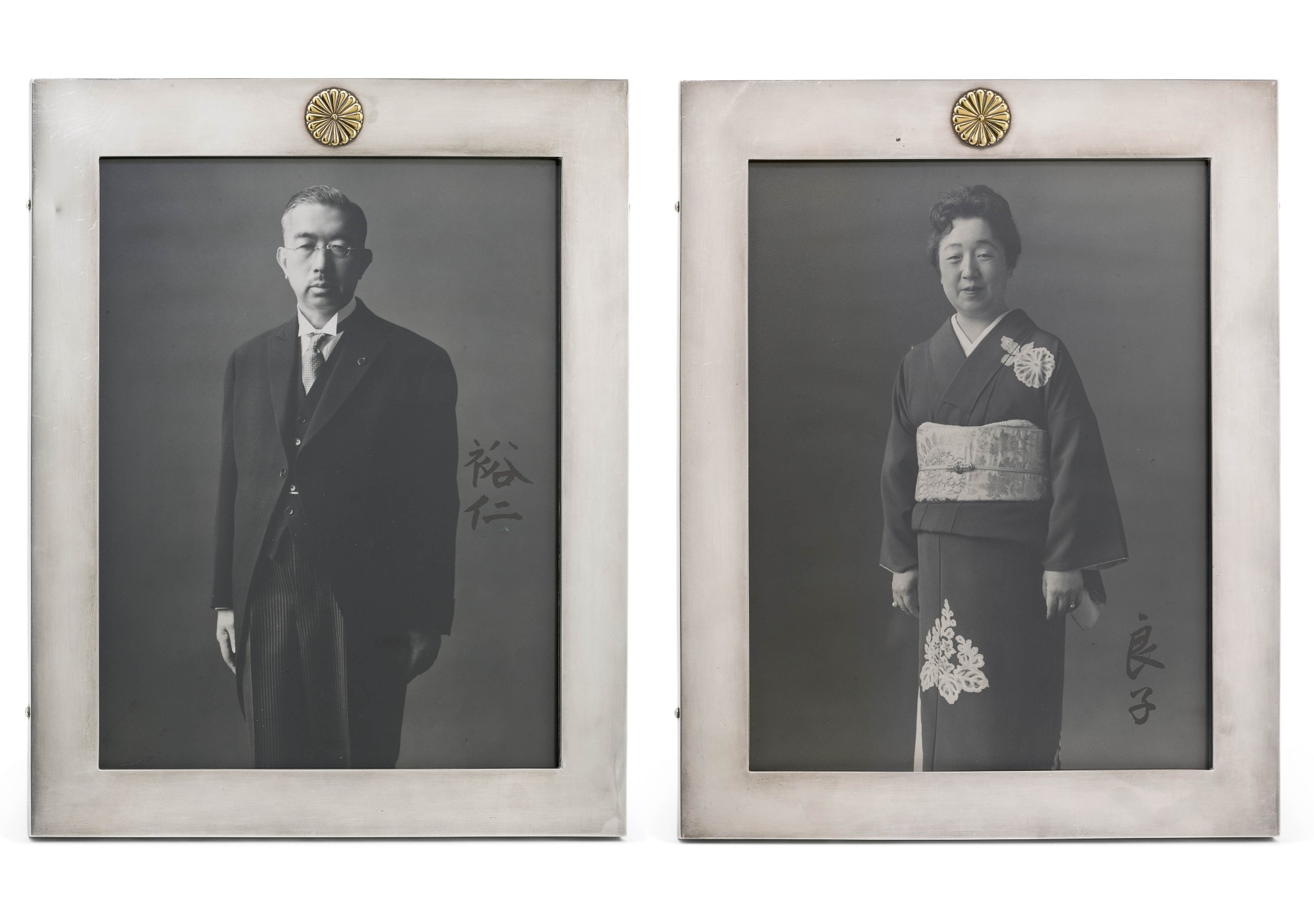 A PAIR OF FRAMED PHOTOGRAPHS OF THE SHOWA EMPEROR AND EMPRESS, SHOWA ...