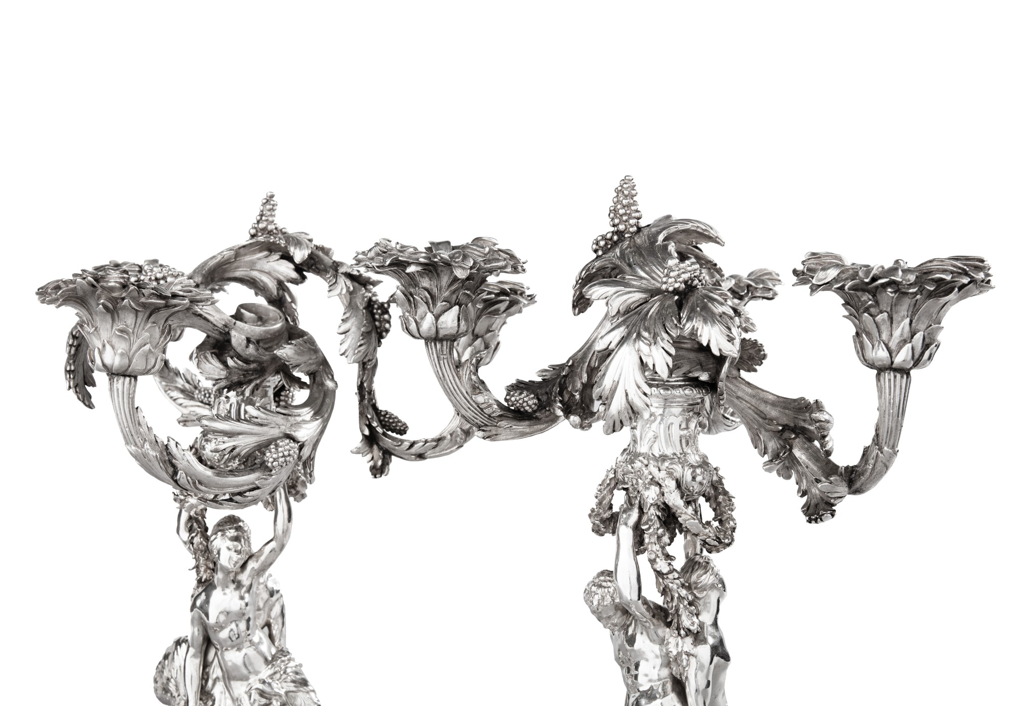 A pair of George II silver figural three-light candelabra, George ...