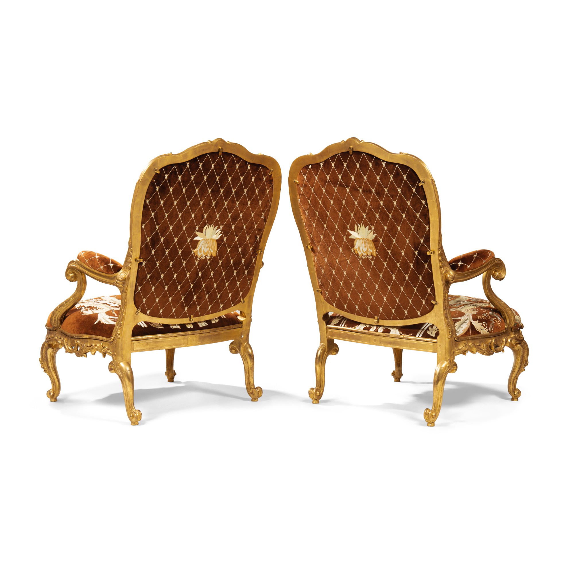A pair of Austrian rococo carved giltwood armchairs, Vienna, mid-18th ...