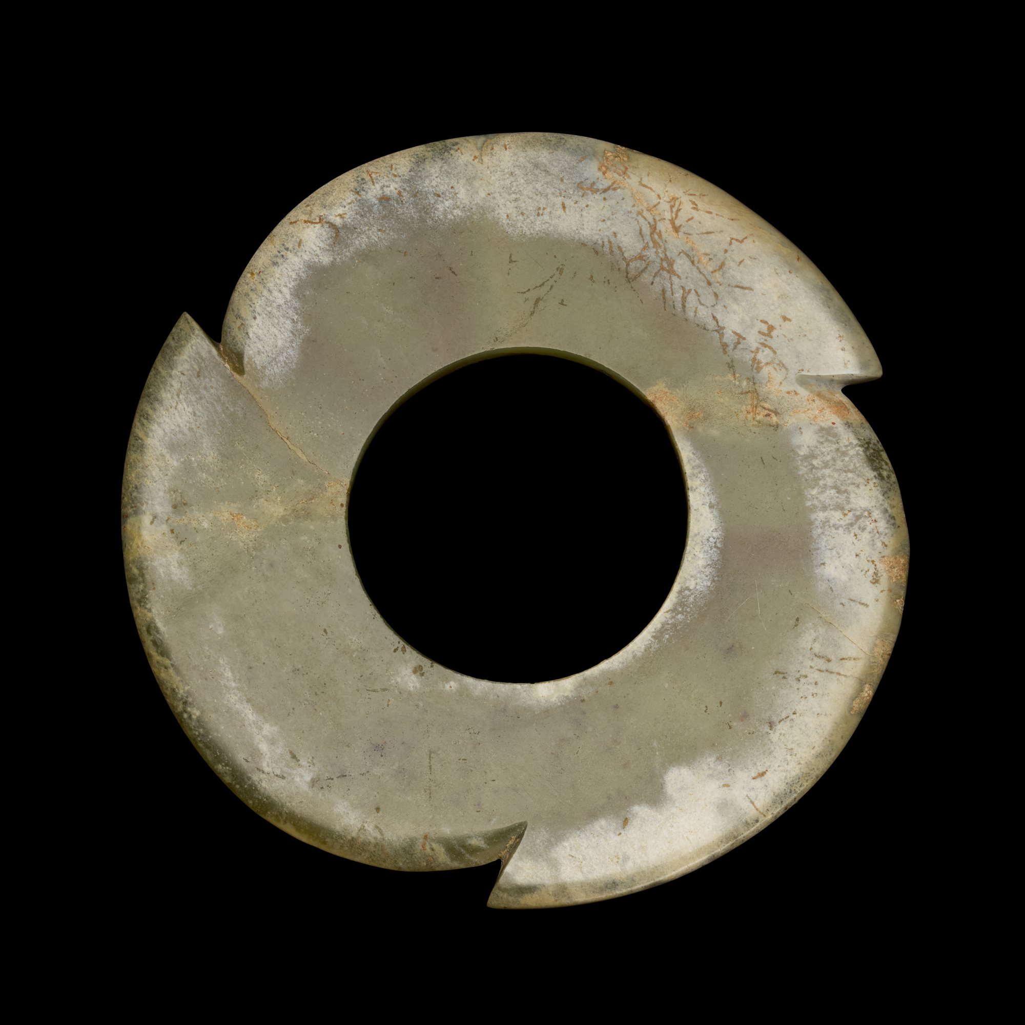 A celadon jade notched disc, Late Neolithic period - Shang dynasty ...
