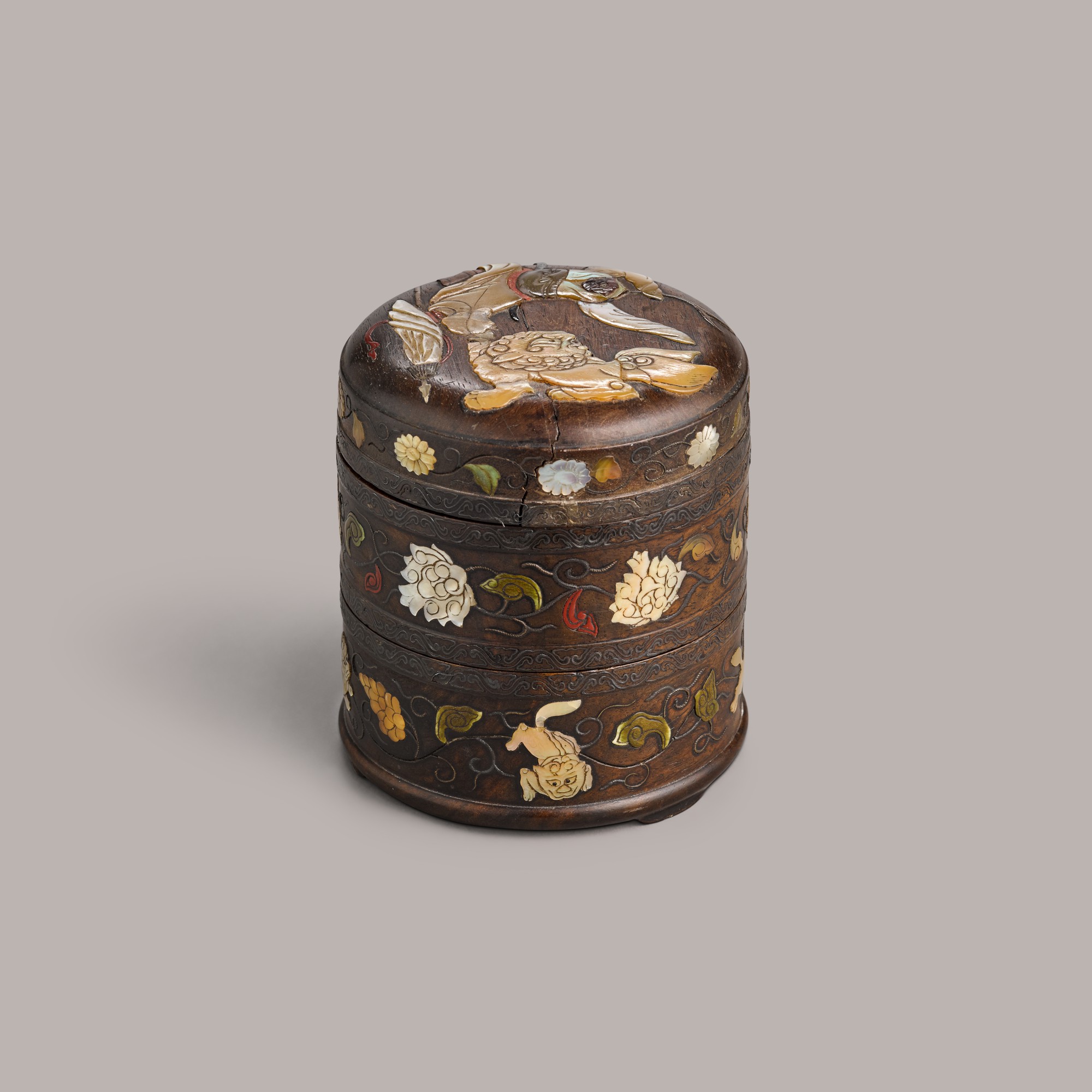 A two-tier mother-of-pearl inlaid zitan box and cover, Qing dynasty ...