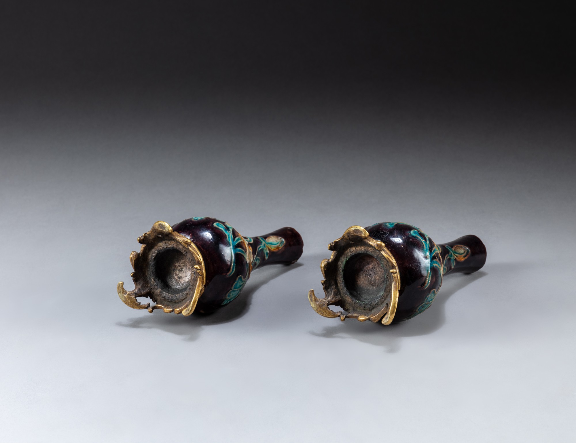 Two small fahua 'lotus' bottle vases, 16th-17th century, with 19th ...