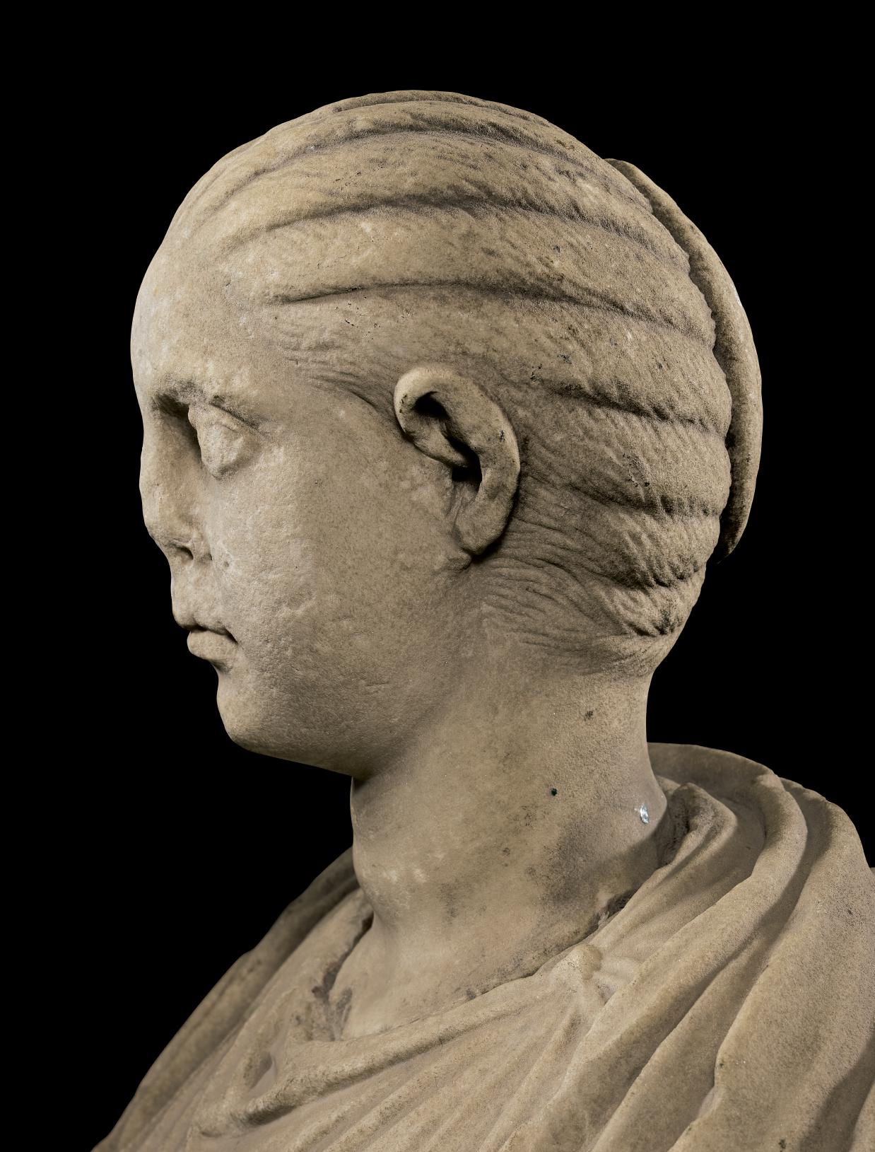 A ROMAN MARBLE PORTRAIT HEAD OF A GIRL, SEVERAN, EARLY 3RD CENTURY A.D ...