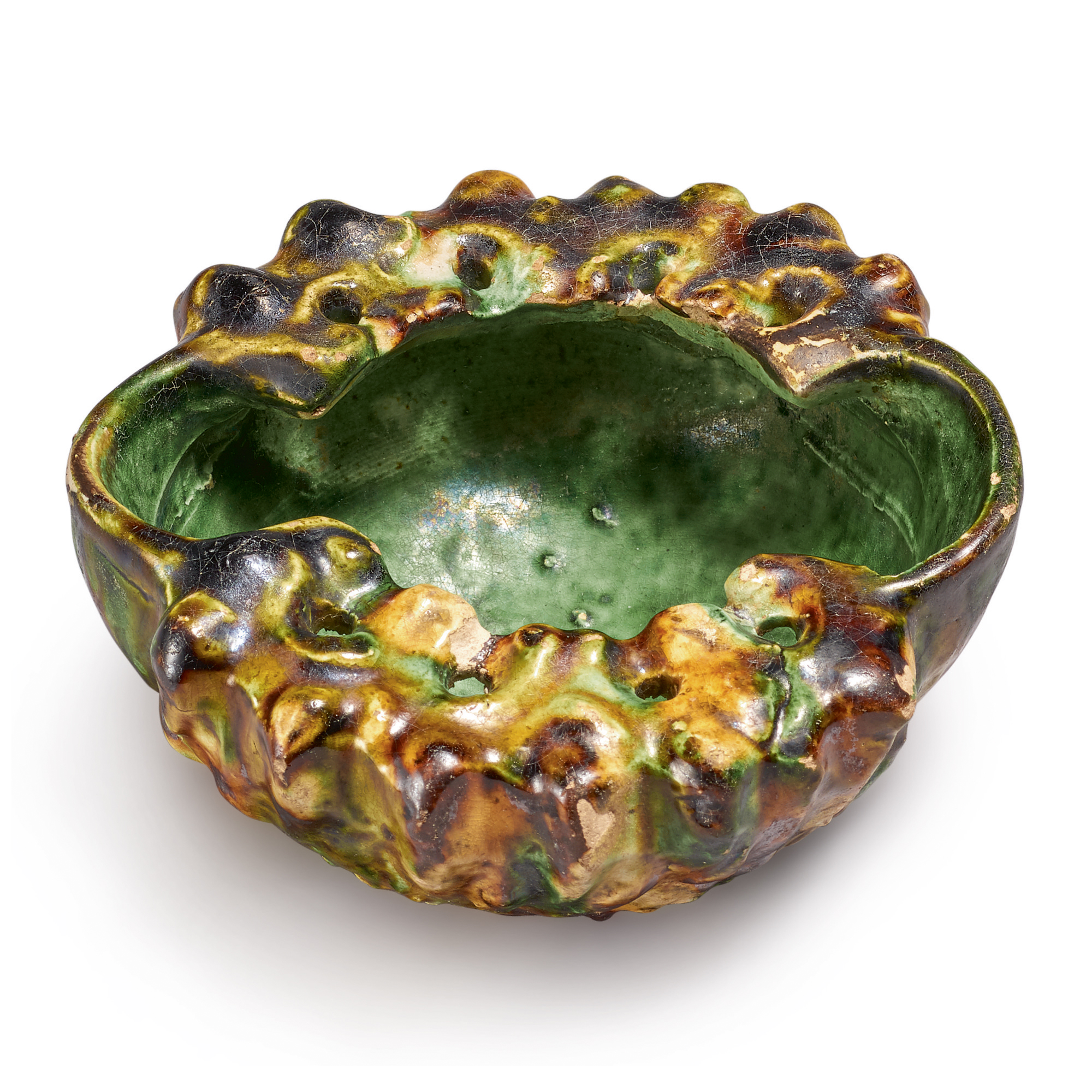 A molded sancai-glazed 'conch shell' pottery cup, Tang dynasty | 唐 ...