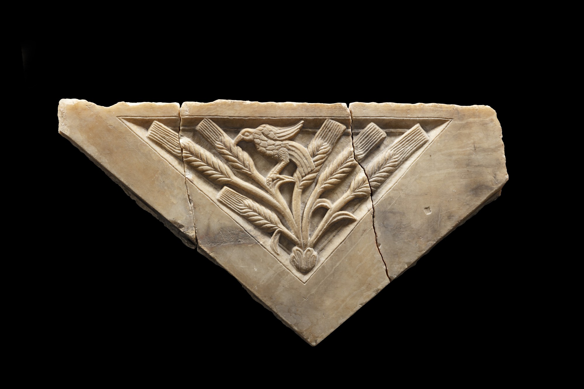 A Group of Four Large South Arabian Triangular Relief Fragments, circa ...