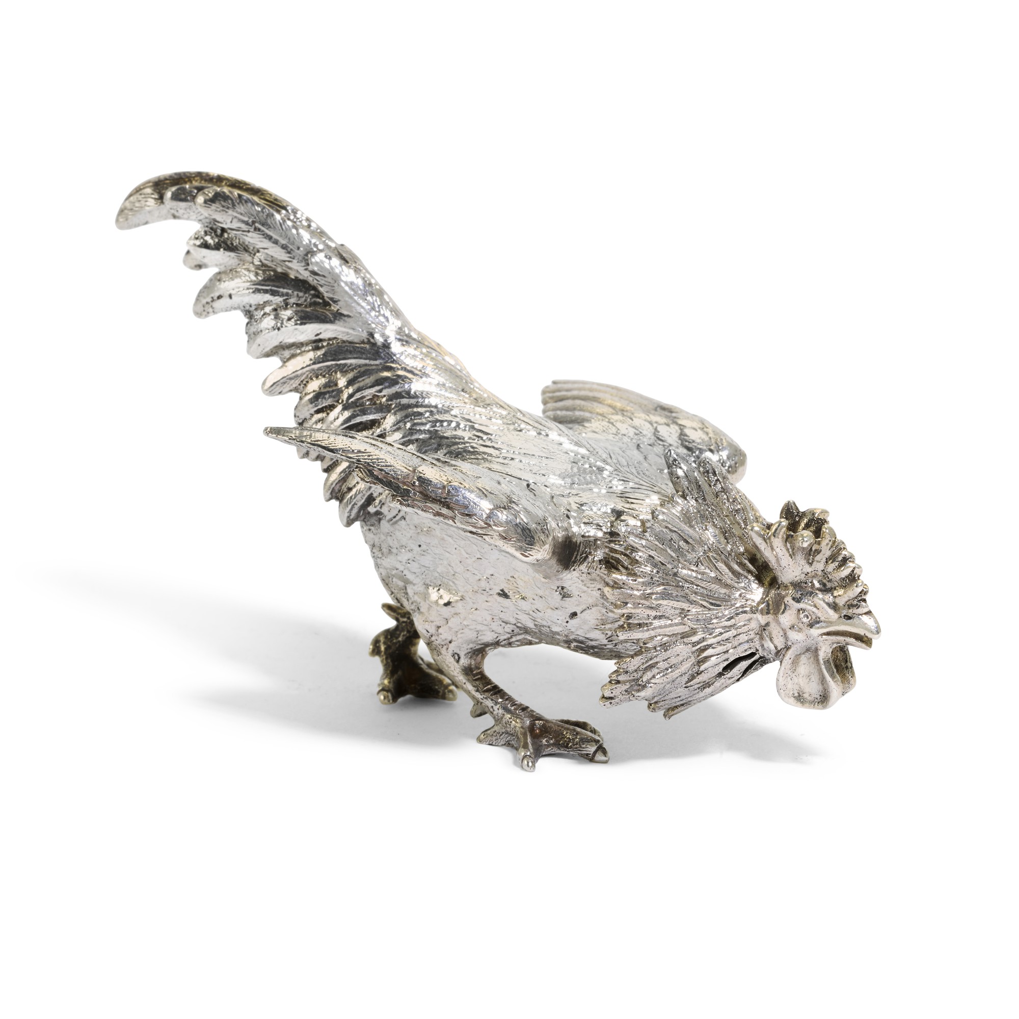 An unusual Victorian silver salt and pepper shaker in the form of a ...