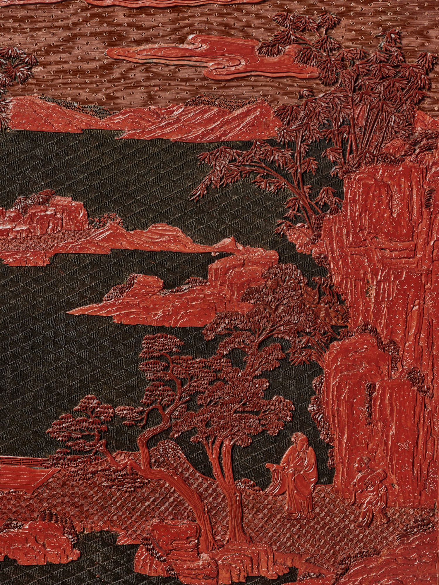 An exceptional pair of carved three-color lacquer 'landscape' panels ...