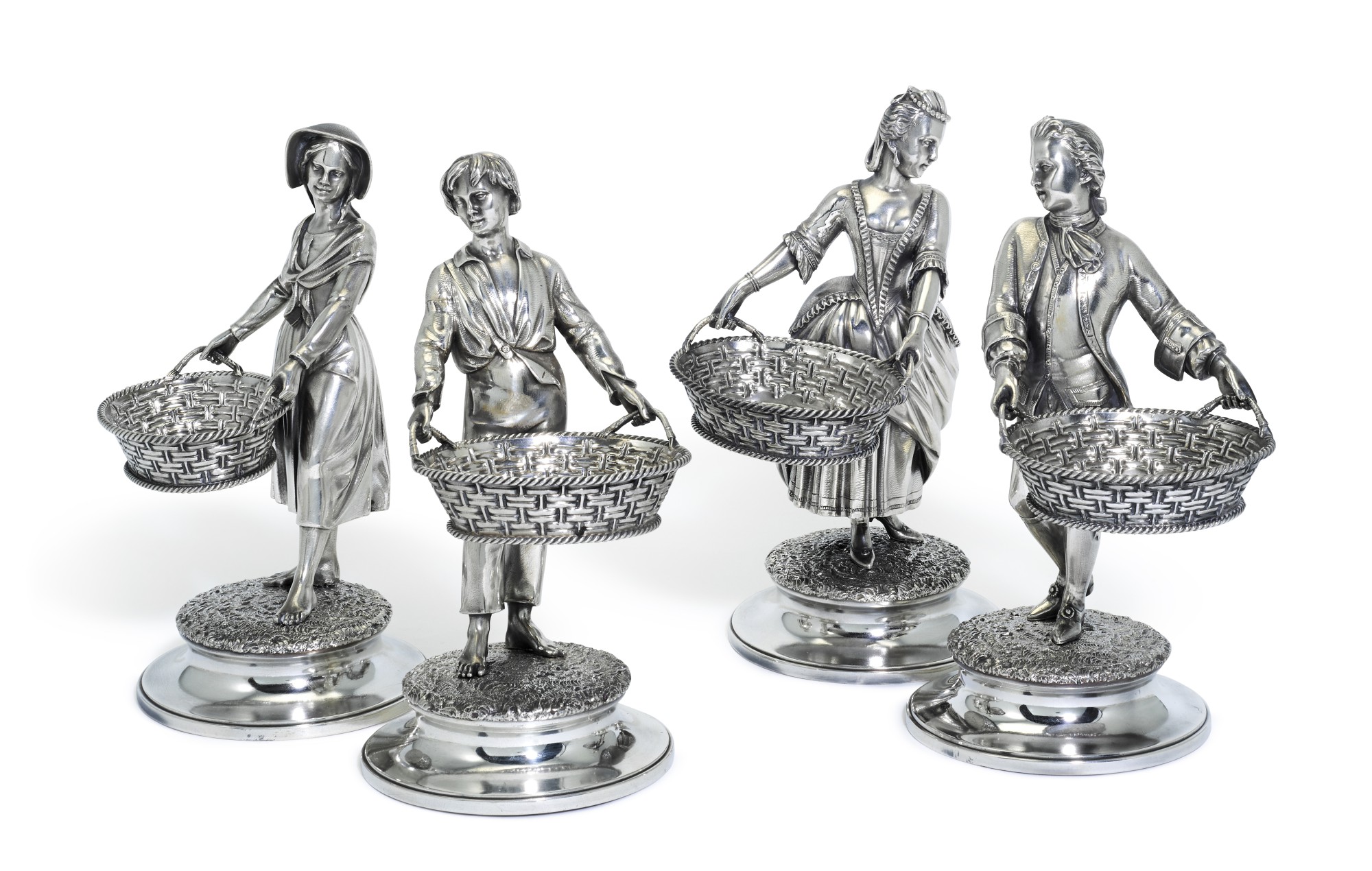 A set of four silver figural table decorations, Edward Barnard & Sons ...