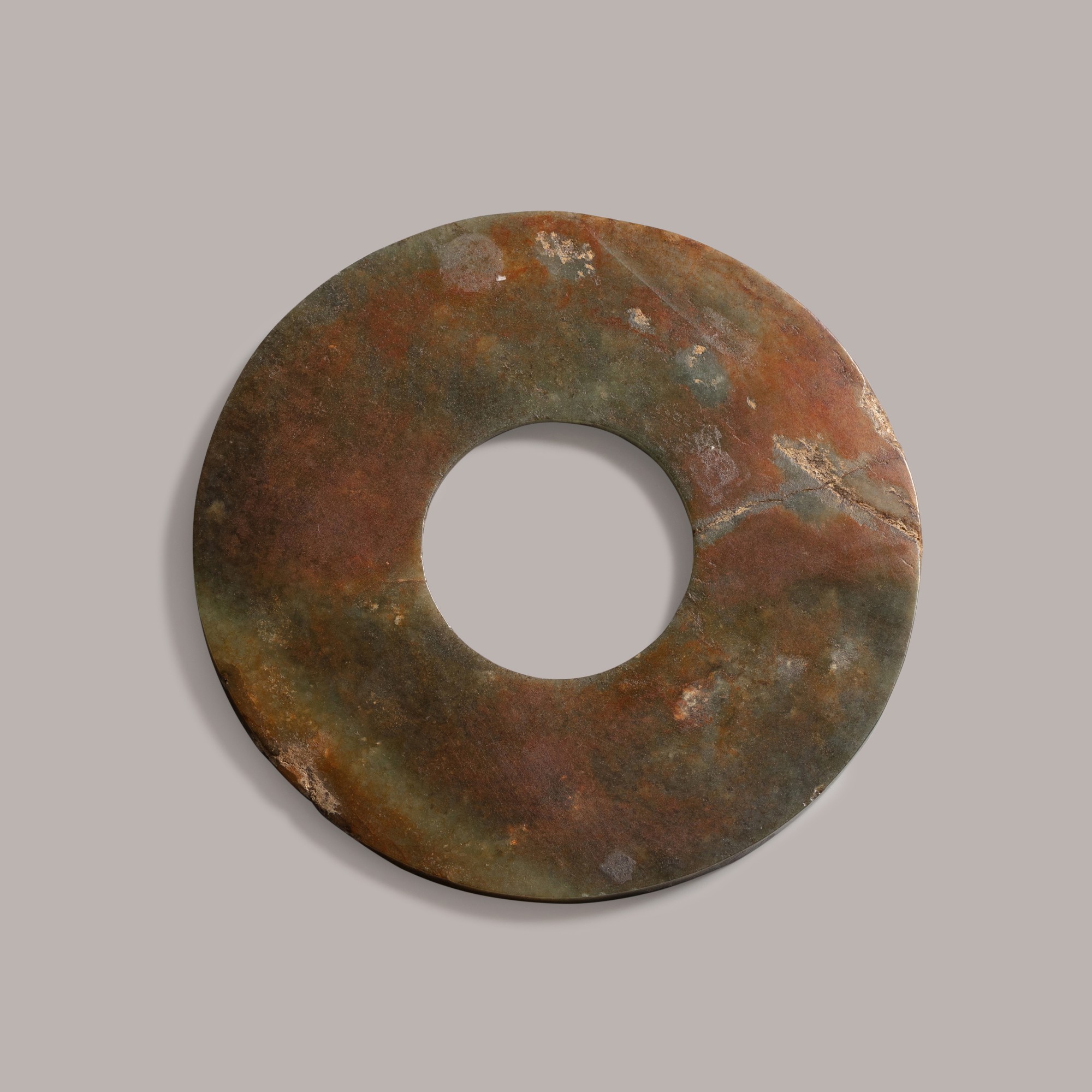 A jade disc, bi, Neolithic period-Zhou dynasty | 新石器時代至周 玉璧 | Two ...