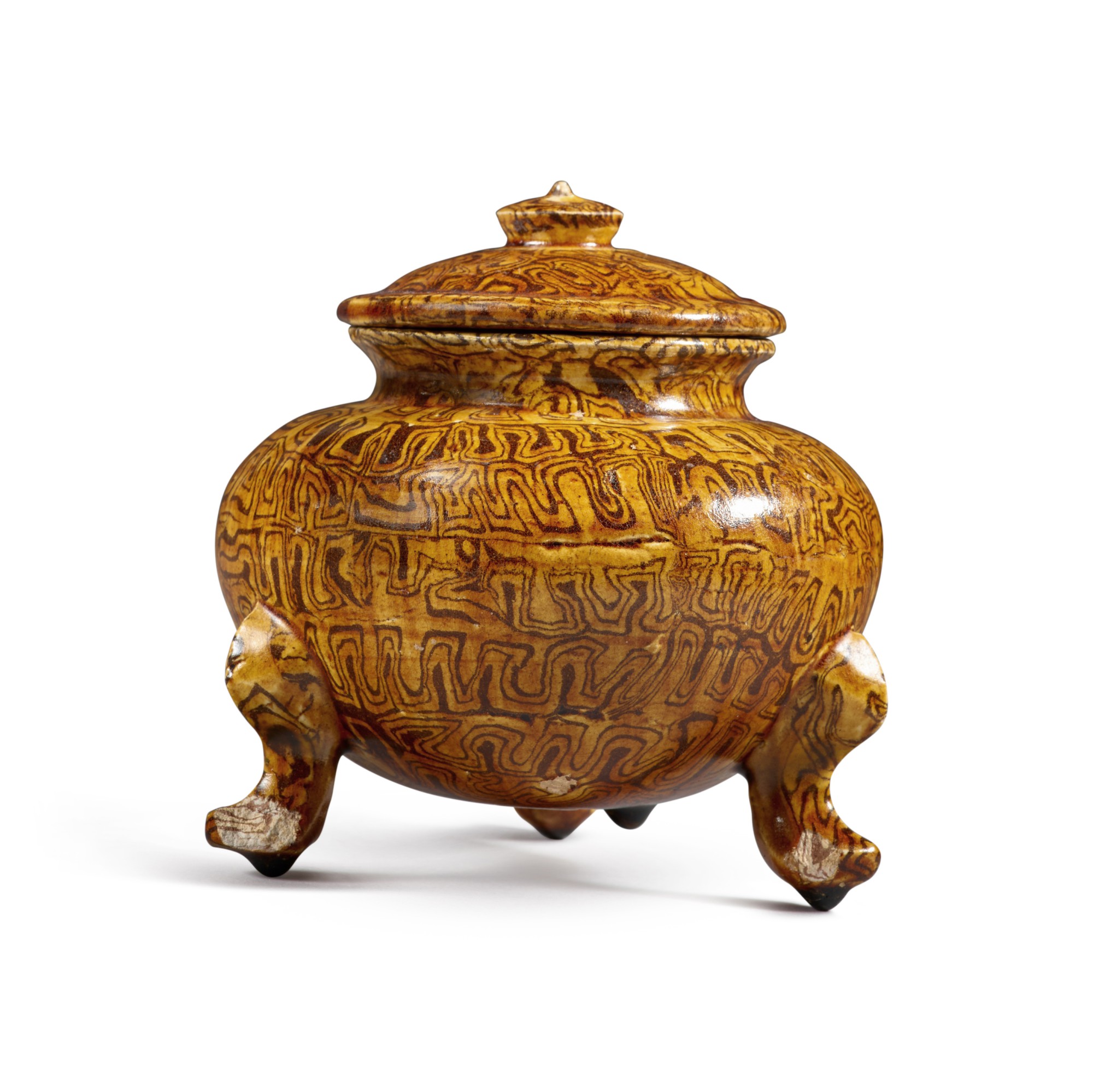 A rare amber-glazed marbled pottery tripod jar and cover, Tang dynasty ...