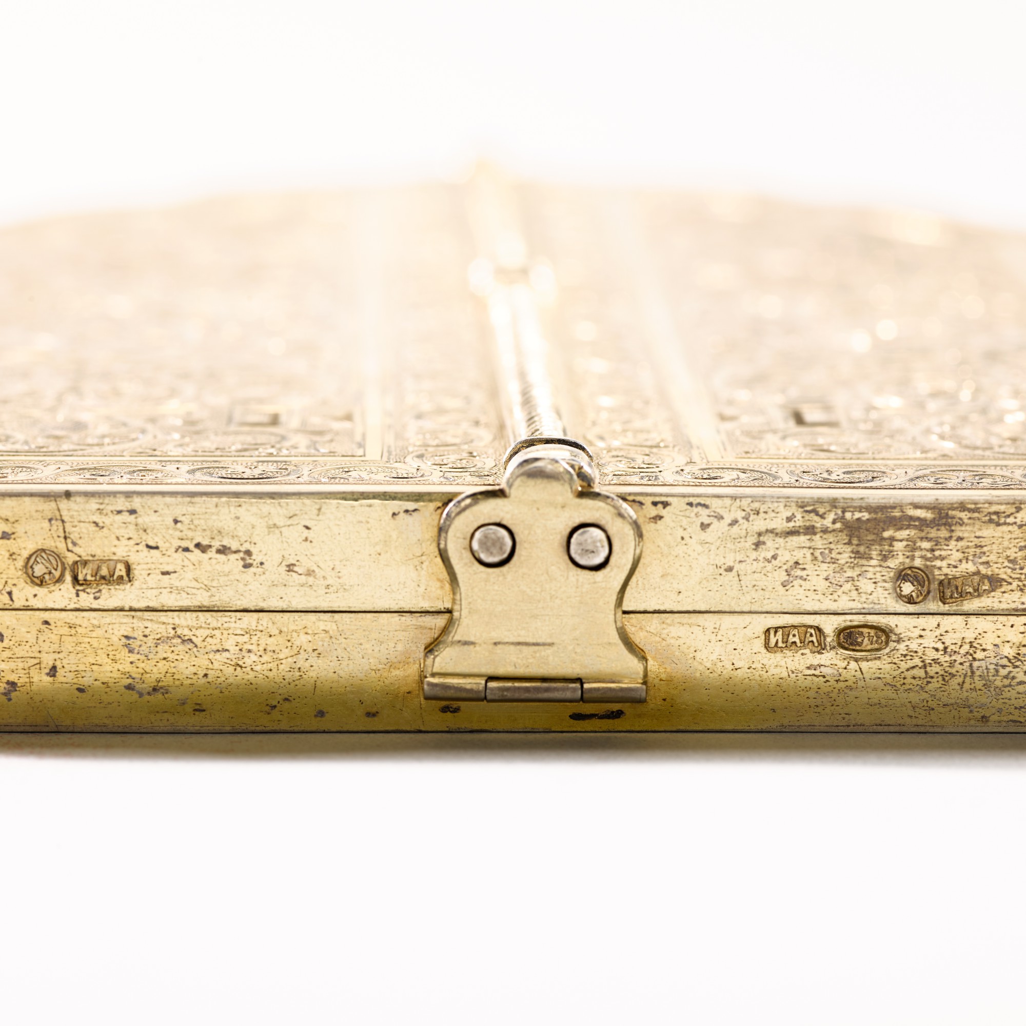 A silver-gilt and shaded enamel travelling triptych icon, Ivan Alekseev, Moscow, 1899-1908 ...