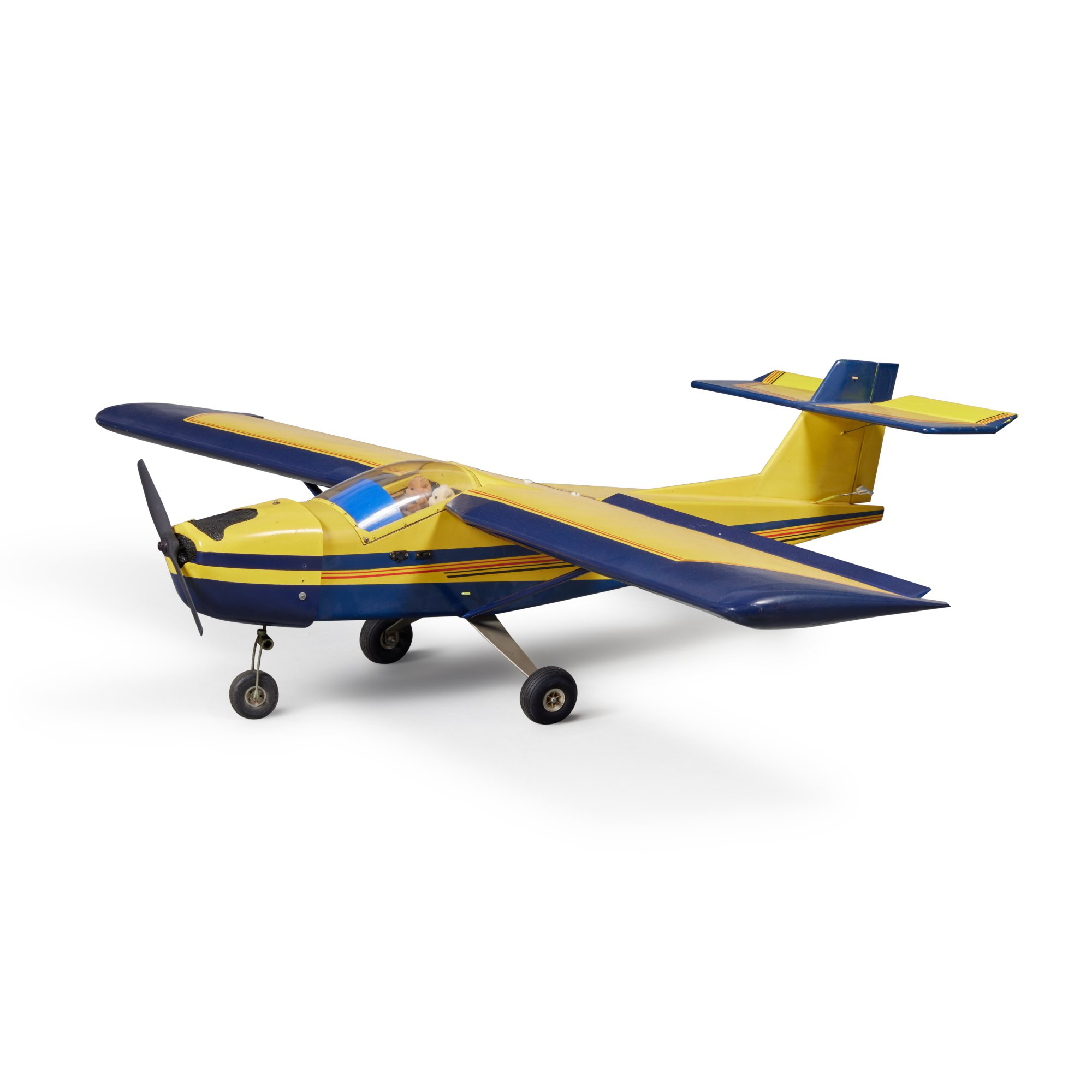 A Model of a Yellow and Blue Civilian Aircraft | Collecting Across ...