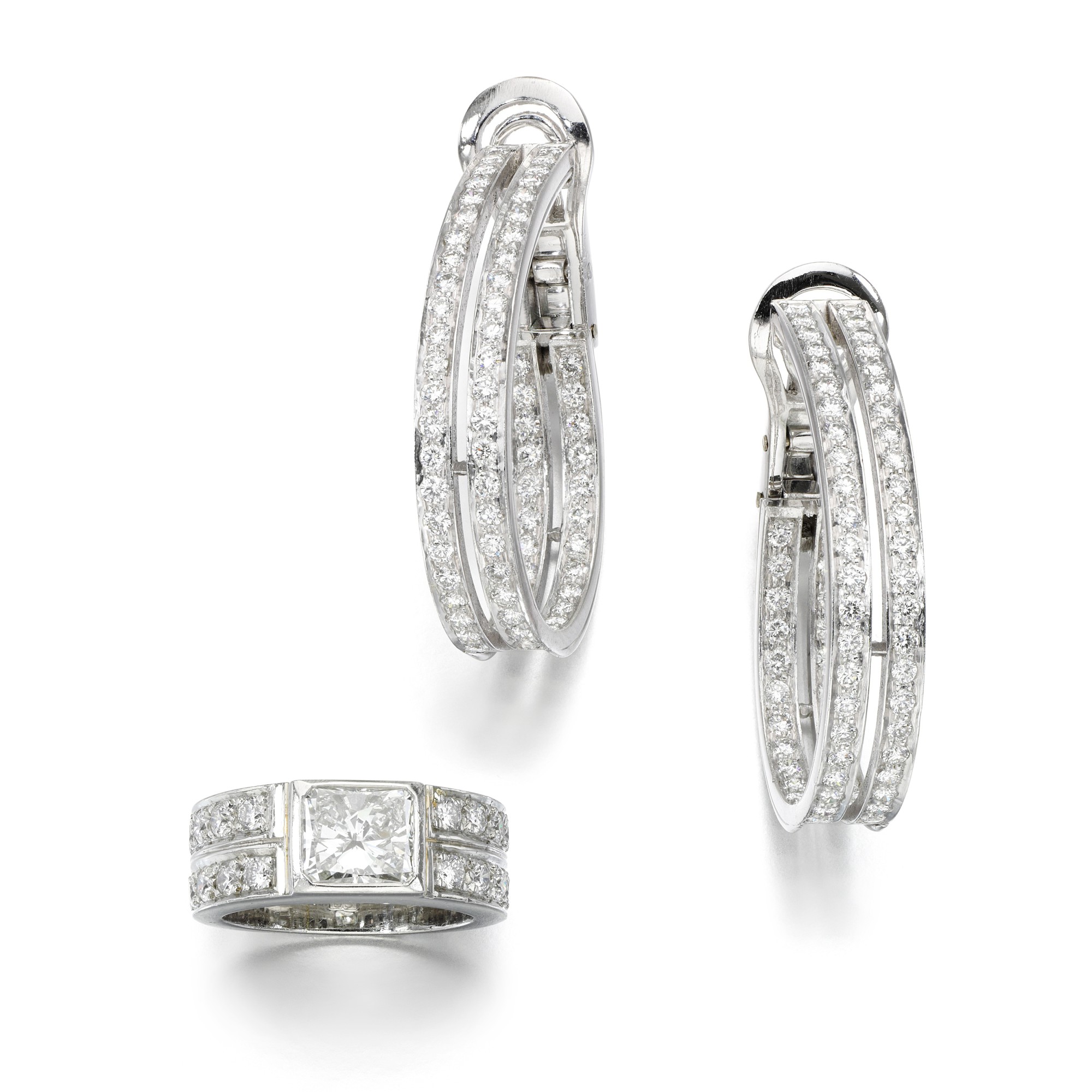 Cassandra Goad | Diamond ring and a pair of diamond ear clips | Town ...