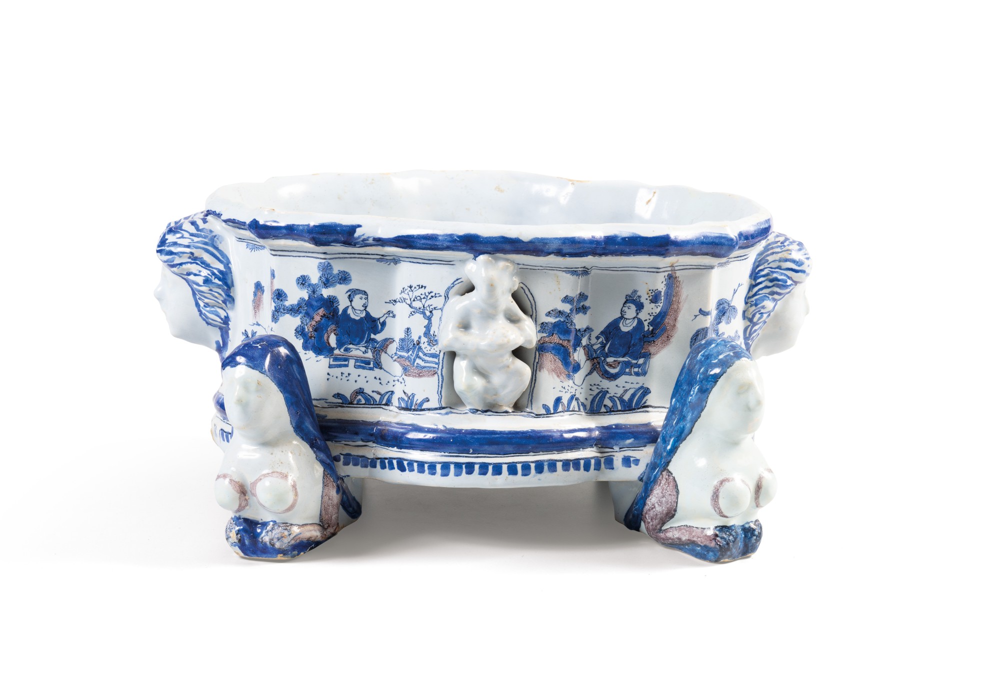 Two earthenware 'pots à oranger', and a Nevers earthenware cooler ...