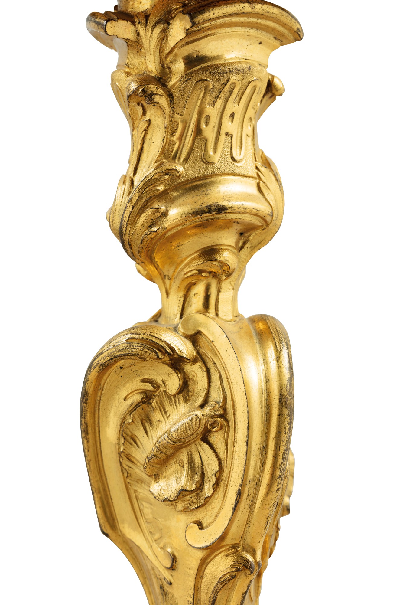 A pair of Louis XV gilt-bronze candlesticks, in the manner of Jules ...