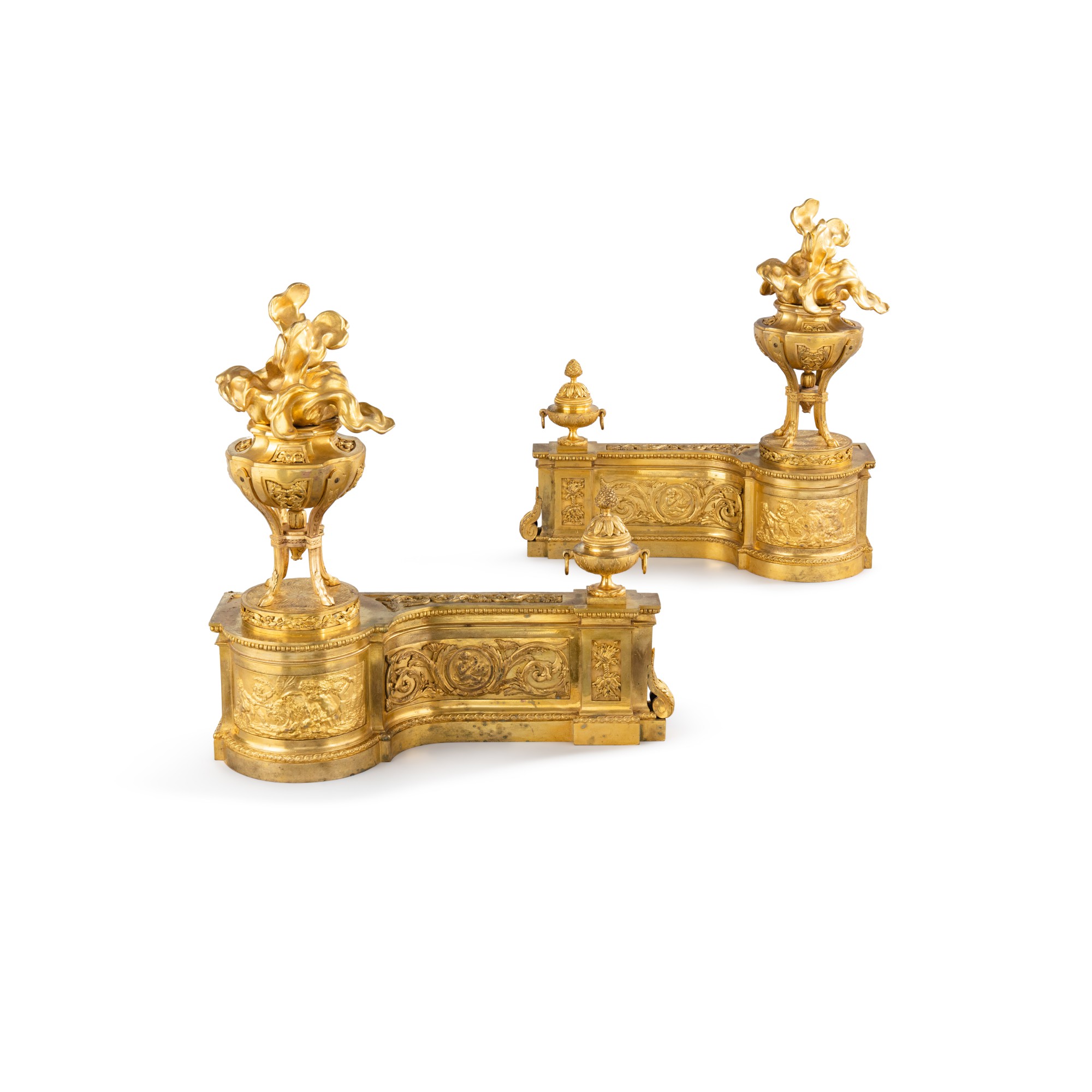 A pair of Louis XVI gilt-bronze chenets attributed to Pierre Gouthière ...