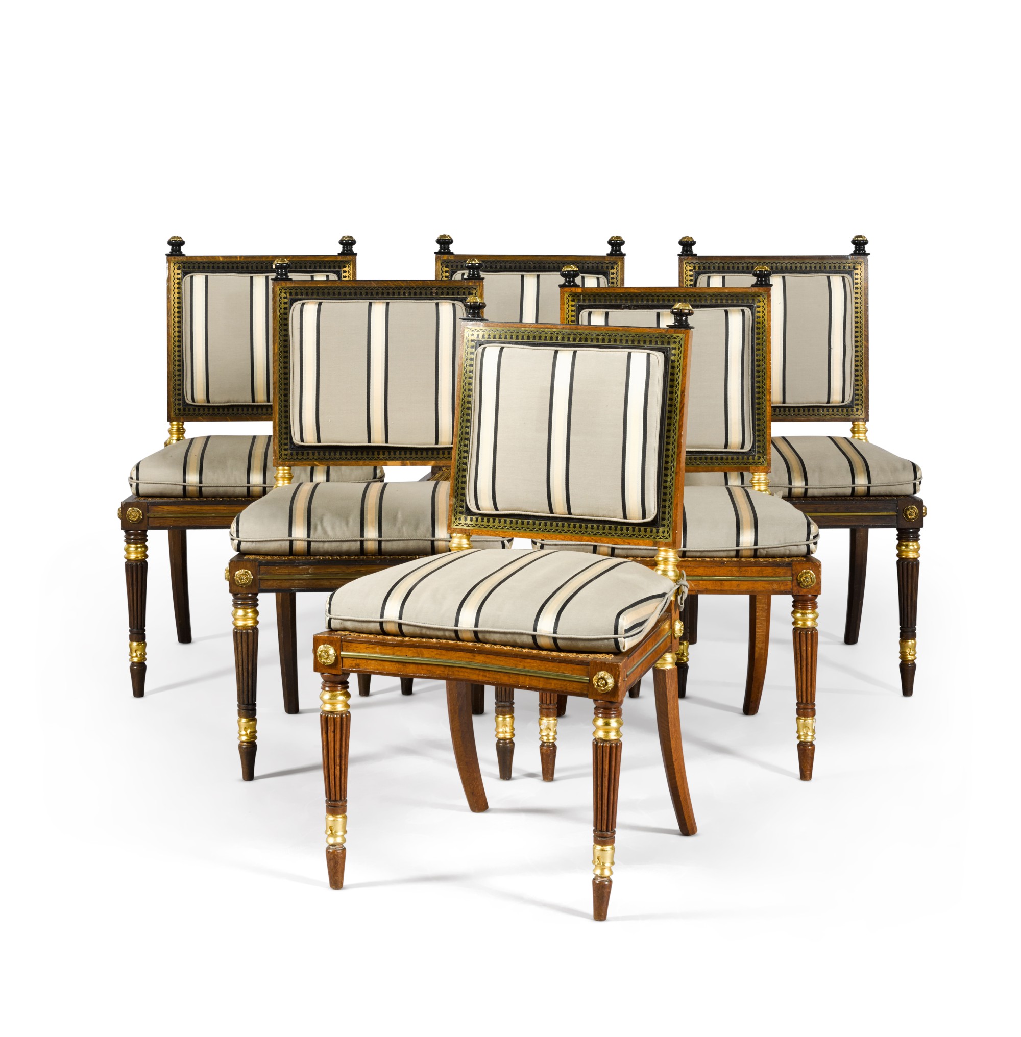 A set of six Regency style brass-mounted and inlaid ebony and oak side ...