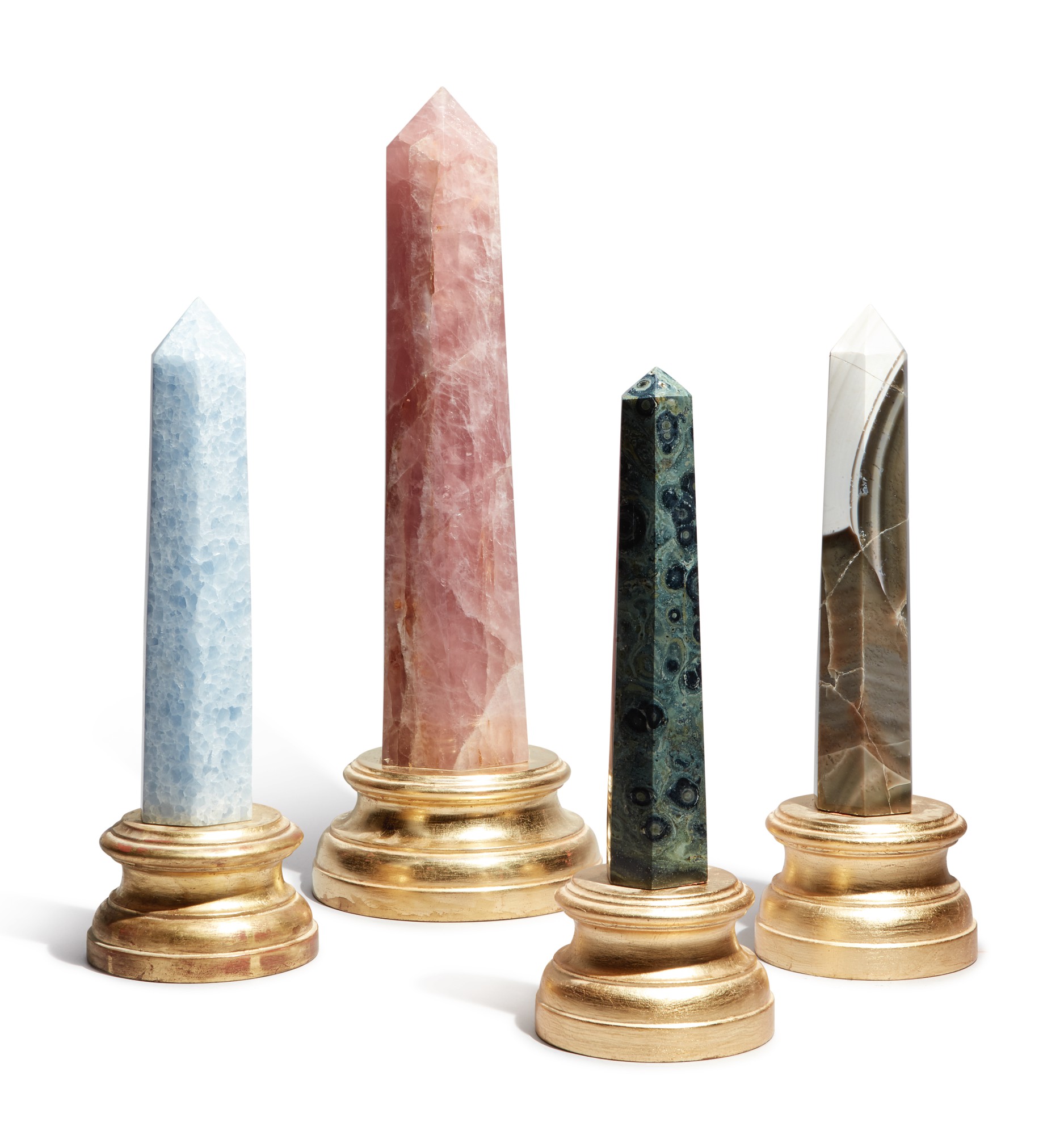 A GROUP OF FOUR STONE OBELISKS | Natural History; Including Fossils ...