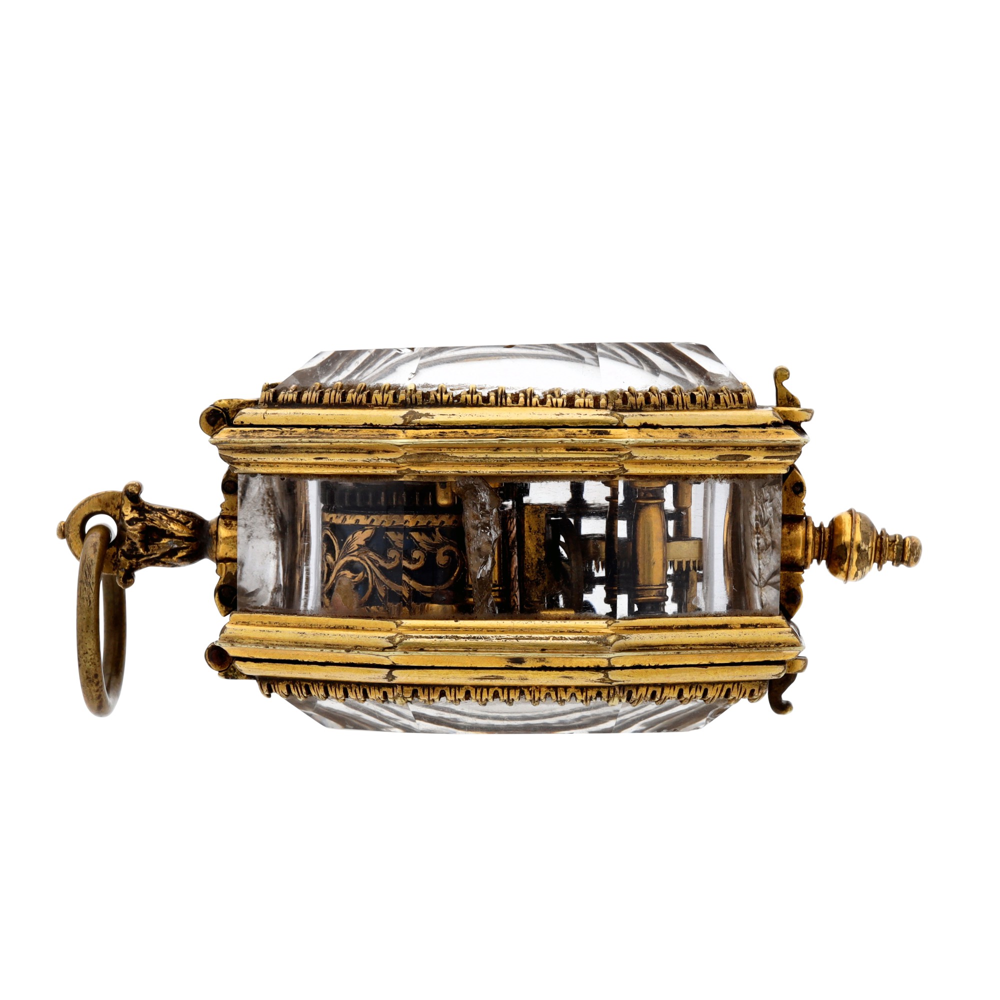 A gilt-brass and rock crystal octagonal verge watch in 17th century ...