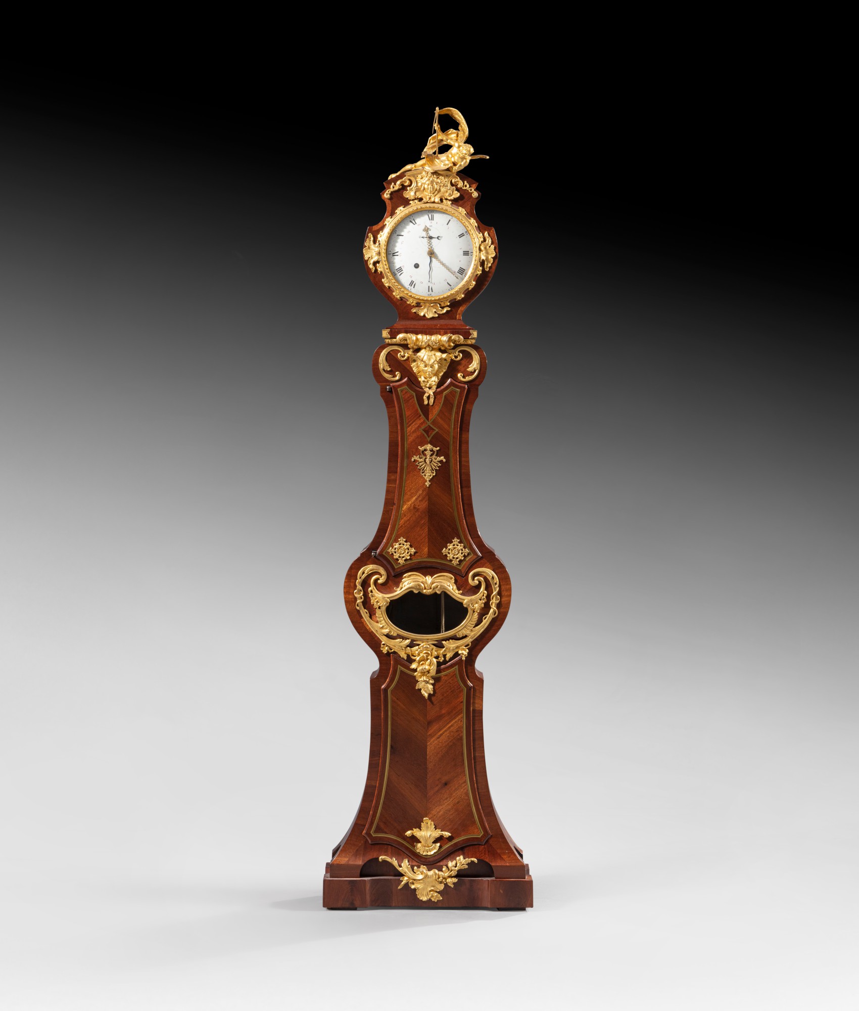 An ormoulu mounted amaranth longcase clock, Régence, by Charles ...