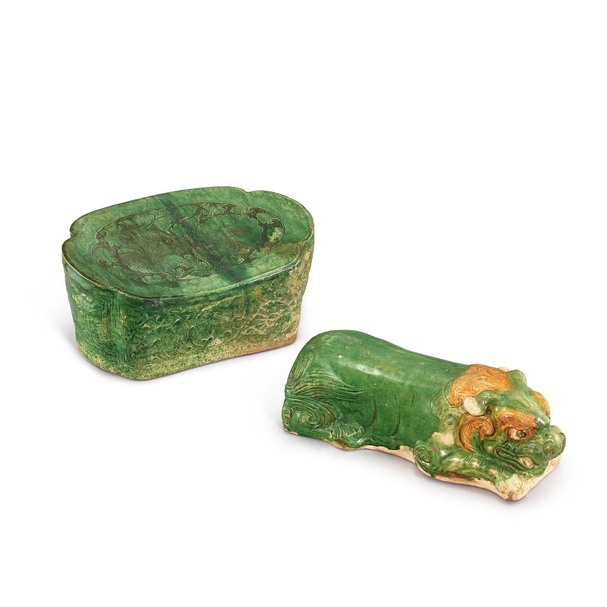 A sancai 'tiger' pillow, Liao dynasty and a carved Cizhou green-glazed ...