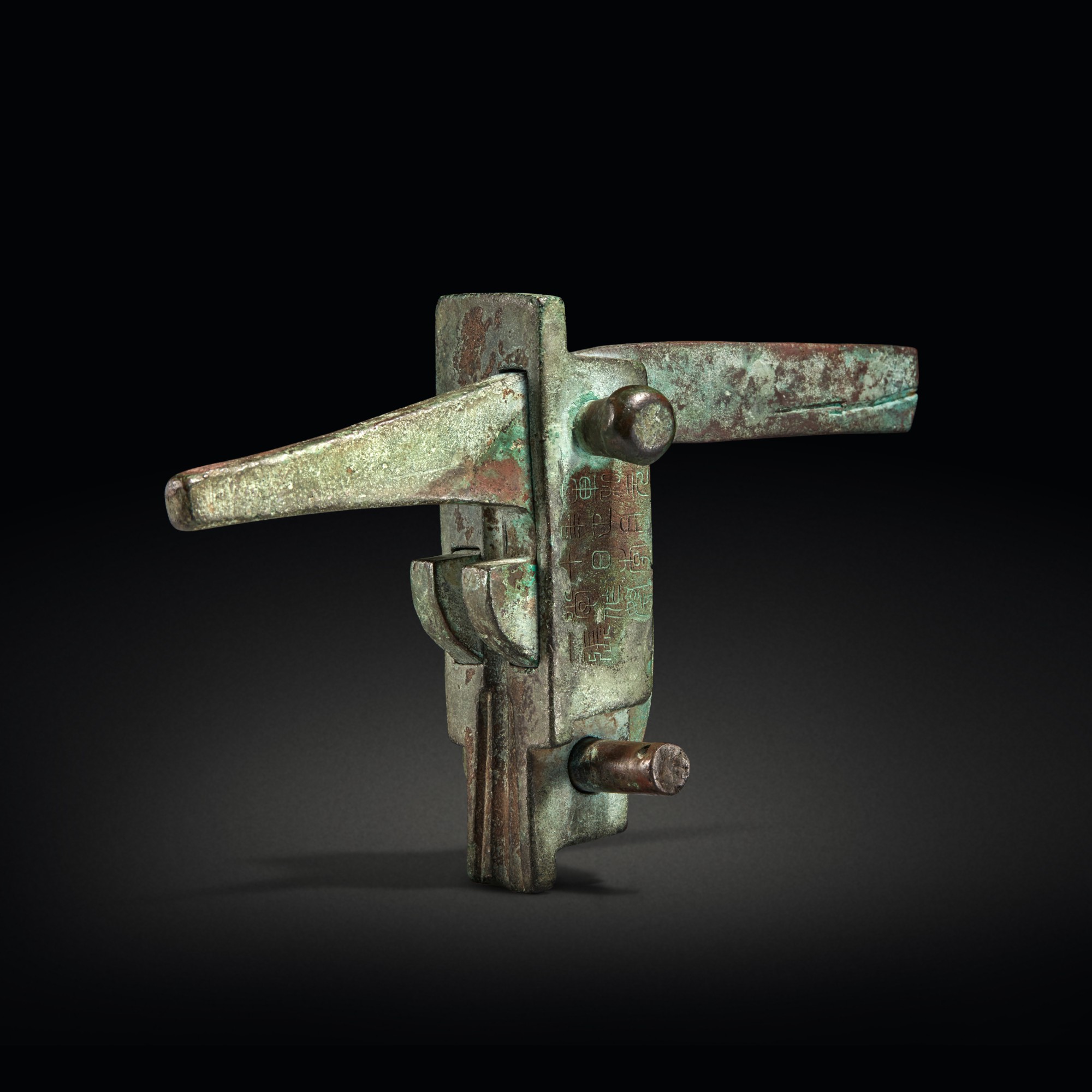 An inscribed bronze crossbow trigger, Eastern Han dynasty, dated ...