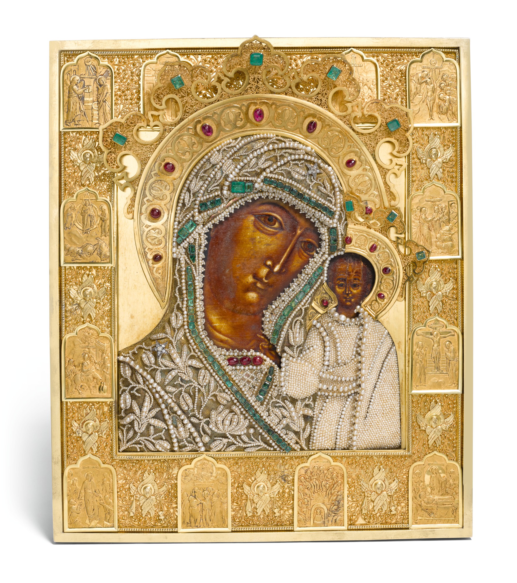 A rare jewelled and pearl-set silver-gilt icon of the Kazanskaya Mother ...