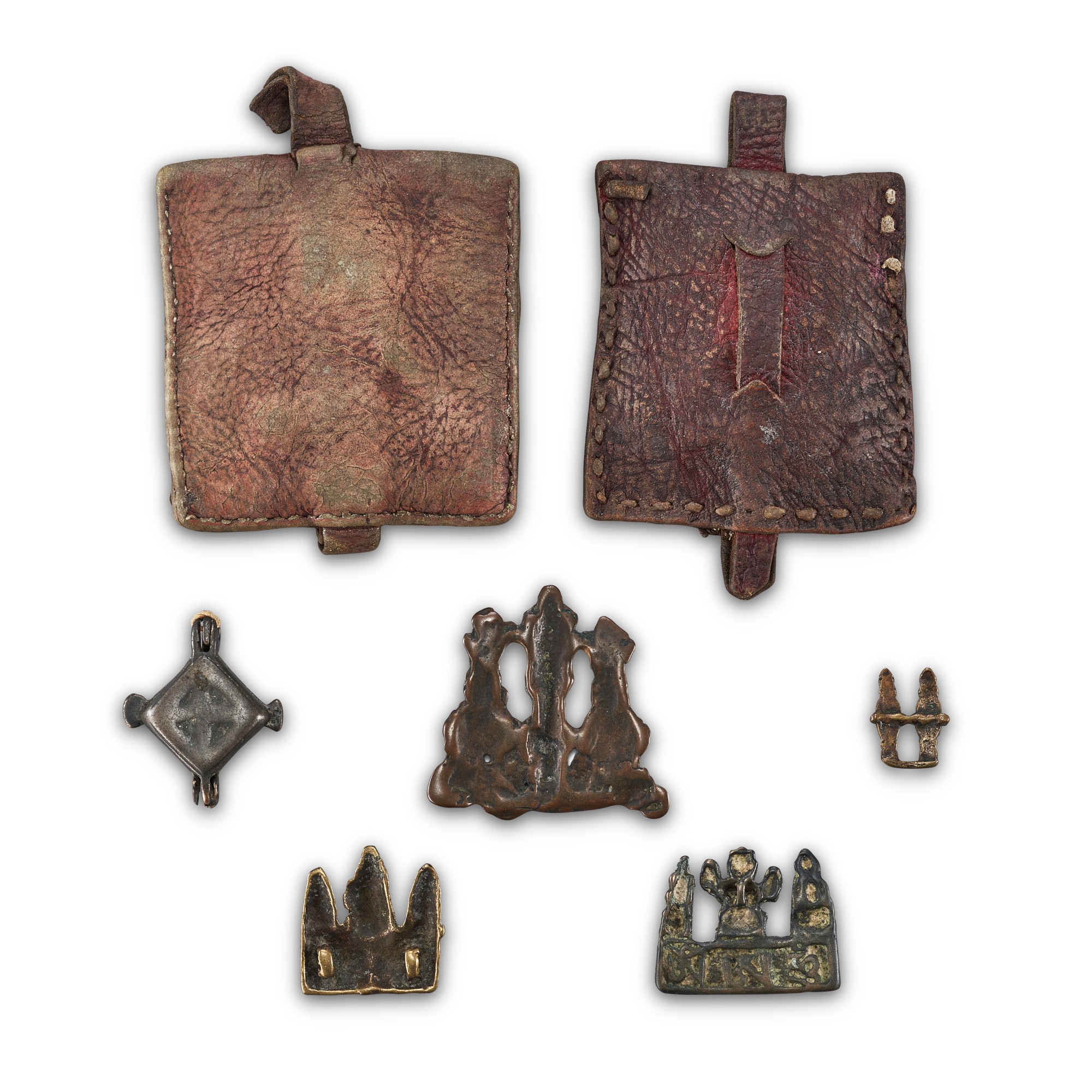 A group of copper-alloy 'stupa' thogchags, Gau box and leather pouches ...