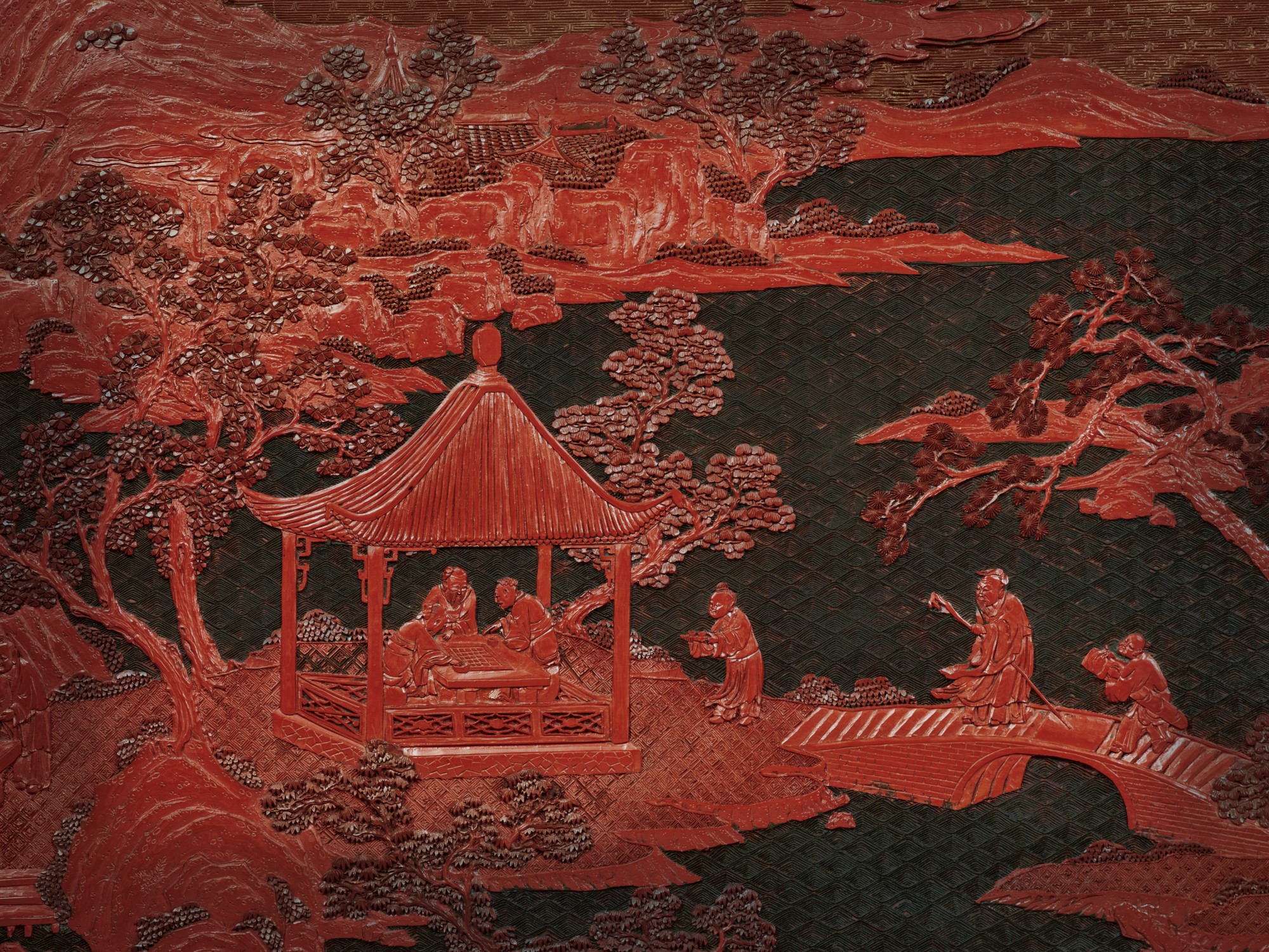 An exceptional pair of carved three-color lacquer 'landscape' panels ...