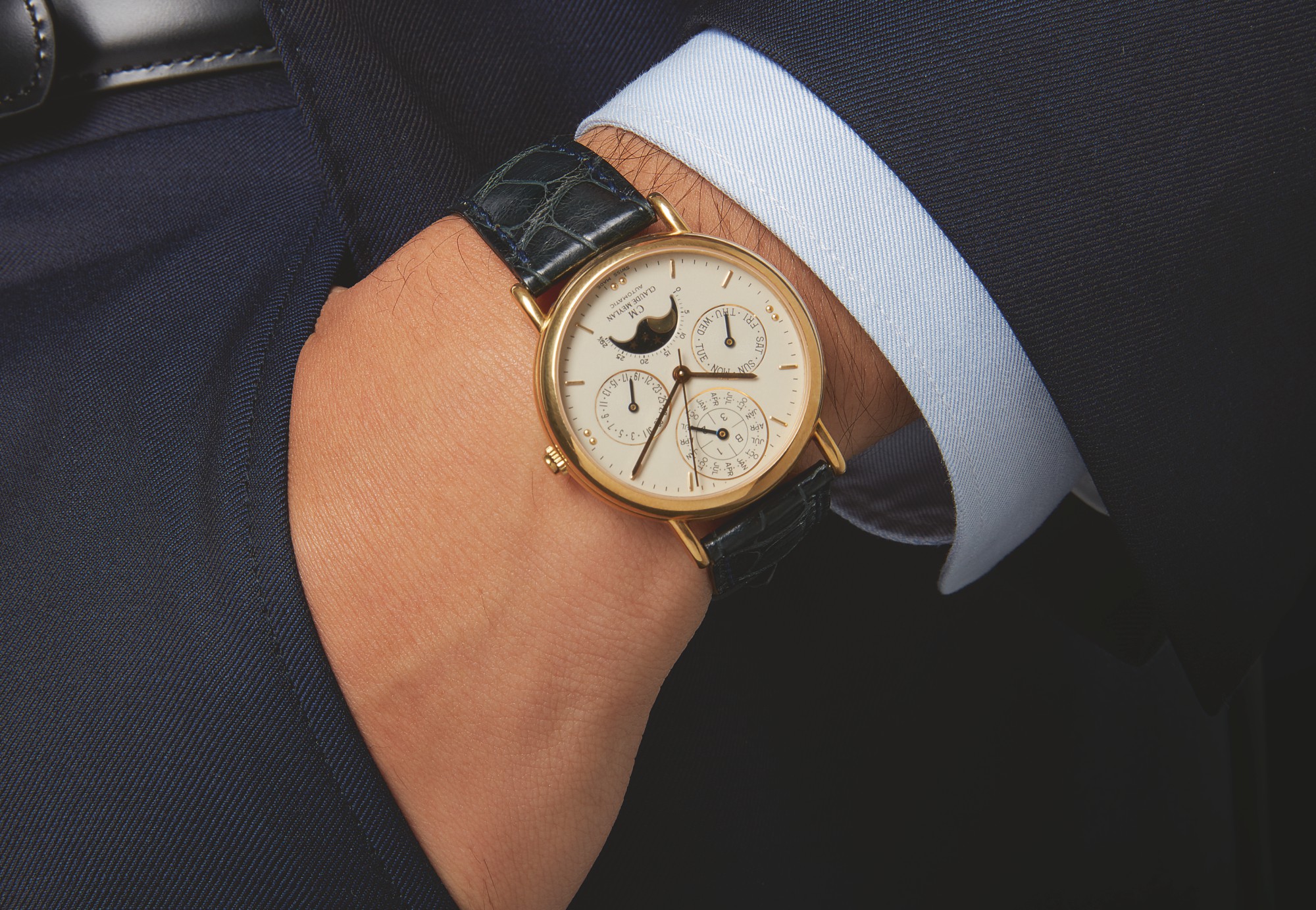 CLAUDE MEYLAN | A YELLOW GOLD PERPETUAL CALENDAR WRISTWATCH CIRCA 1980 ...