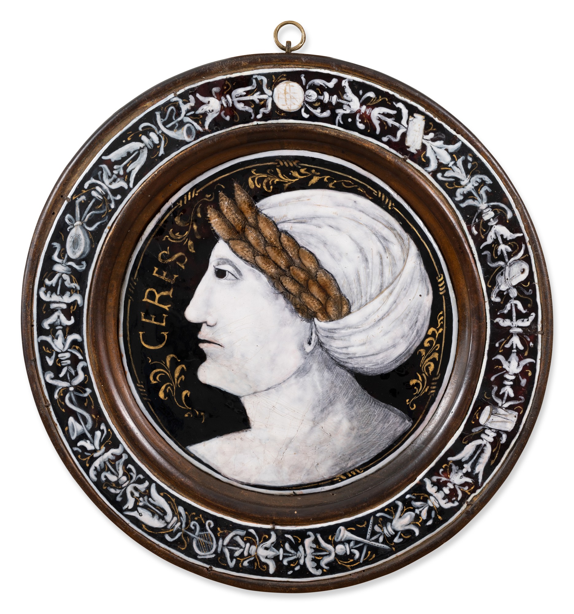 A Limoges grisaille painted enamel medallion with the Profile of Ceres ...
