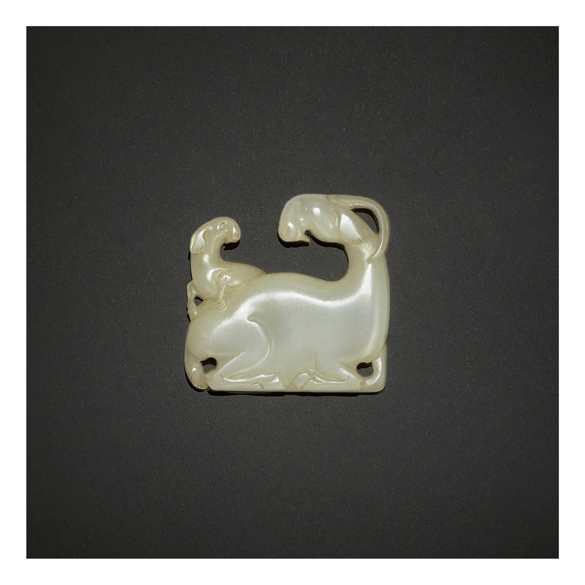 AN EXCEPTIONALLY RARE WHITE JADE 'GOAT' PLAQUE, SONG - YUAN DYNASTY ...