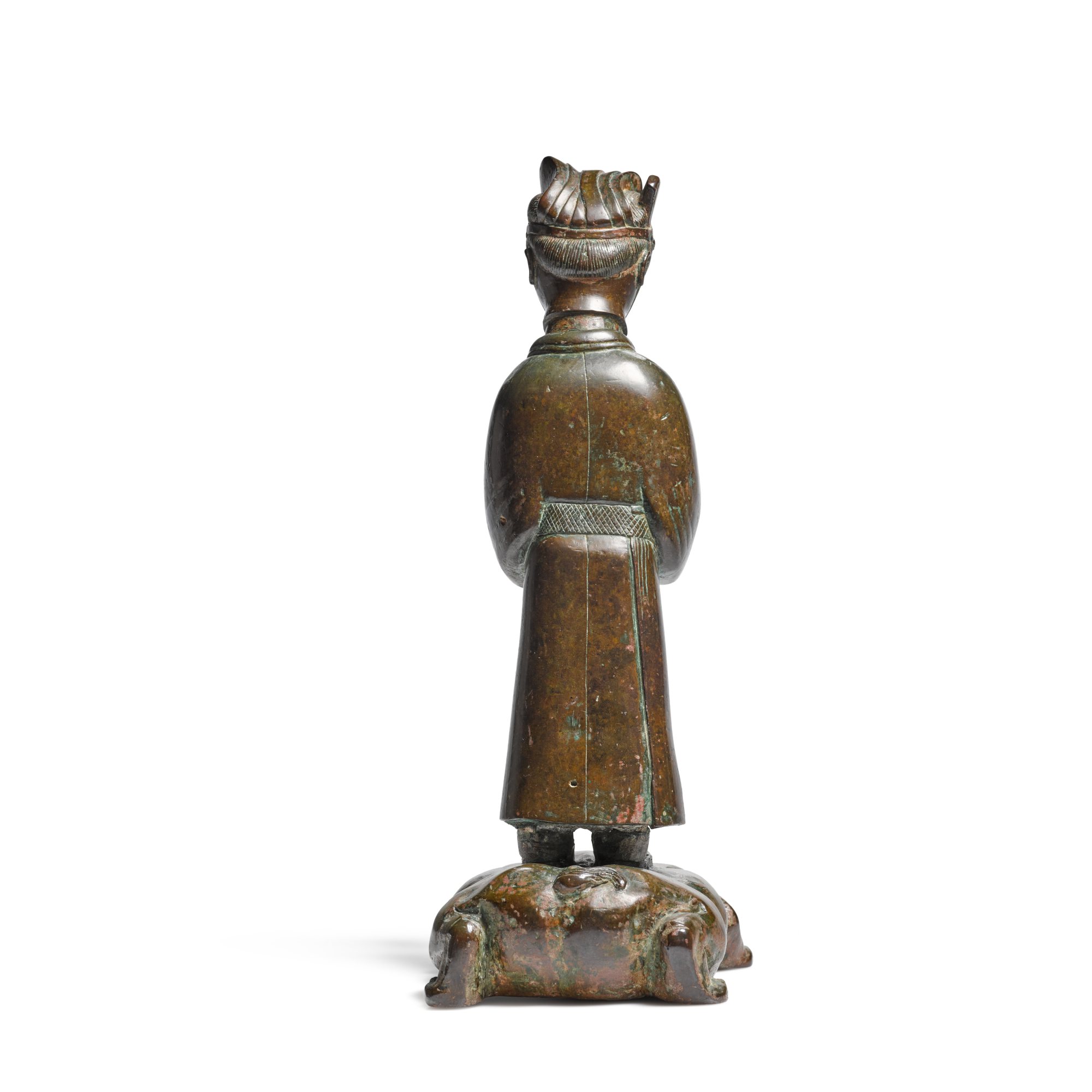 A bronze figure standing on a crouching beast, Eastern Zhou dynasty ...