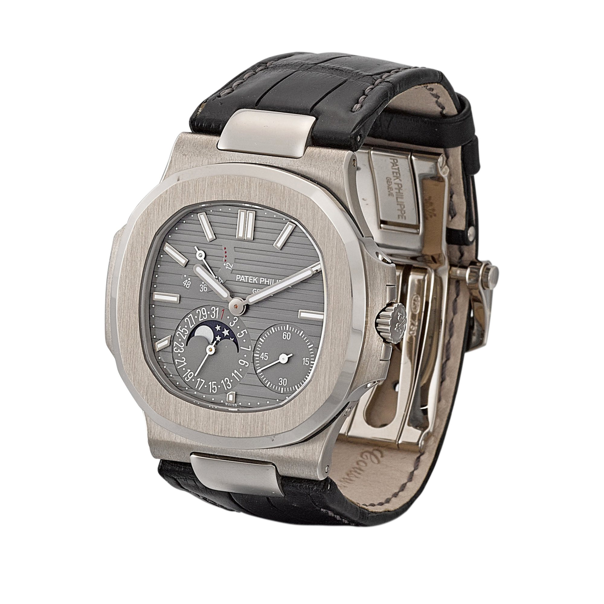 Nautilus, Reference 5712 | A white gold wristwatch with date, moon ...