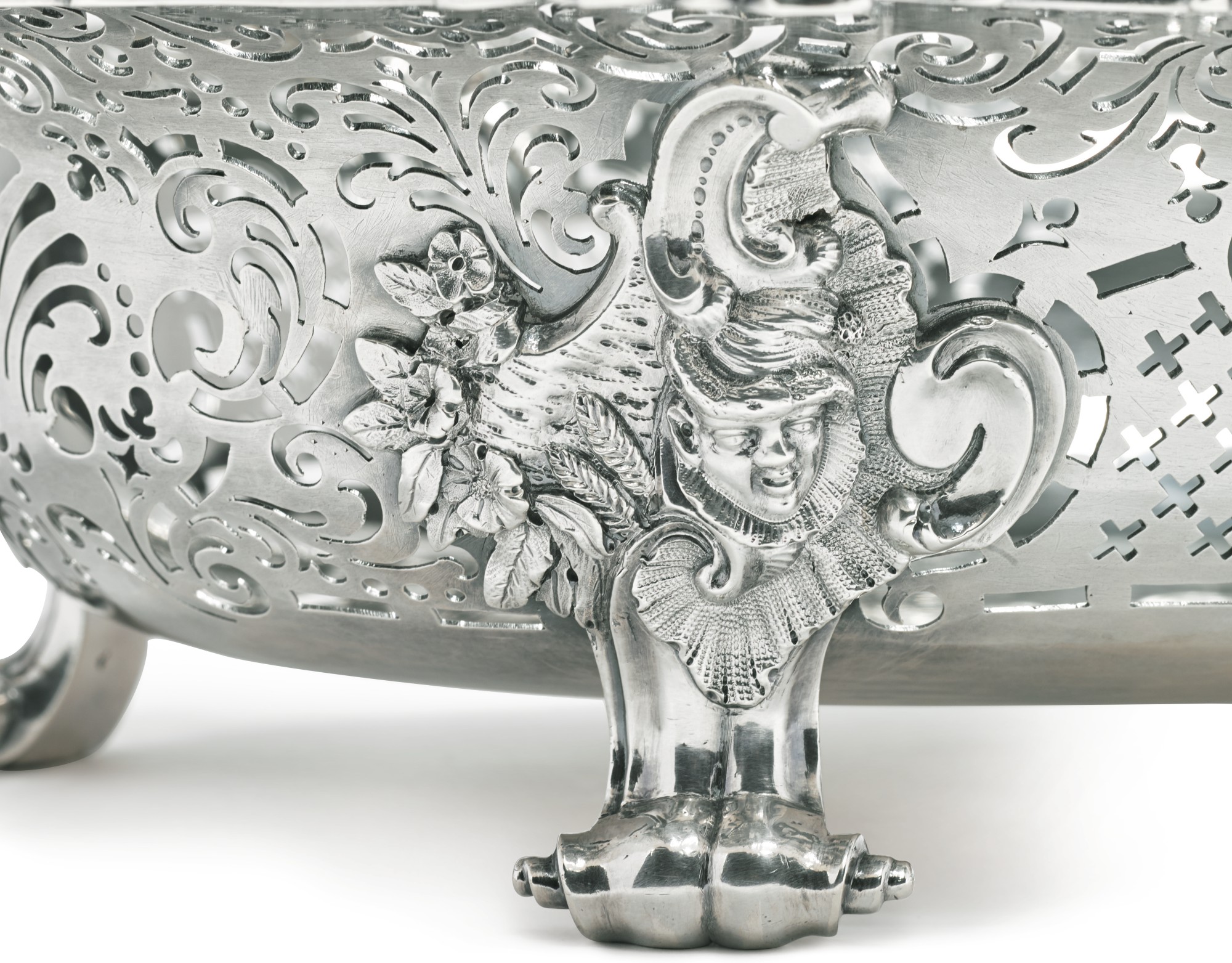 A GEORGE II ROYAL SILVER CAKE BASKET WITH THE ARMS OF FREDERICK, PRINCE ...