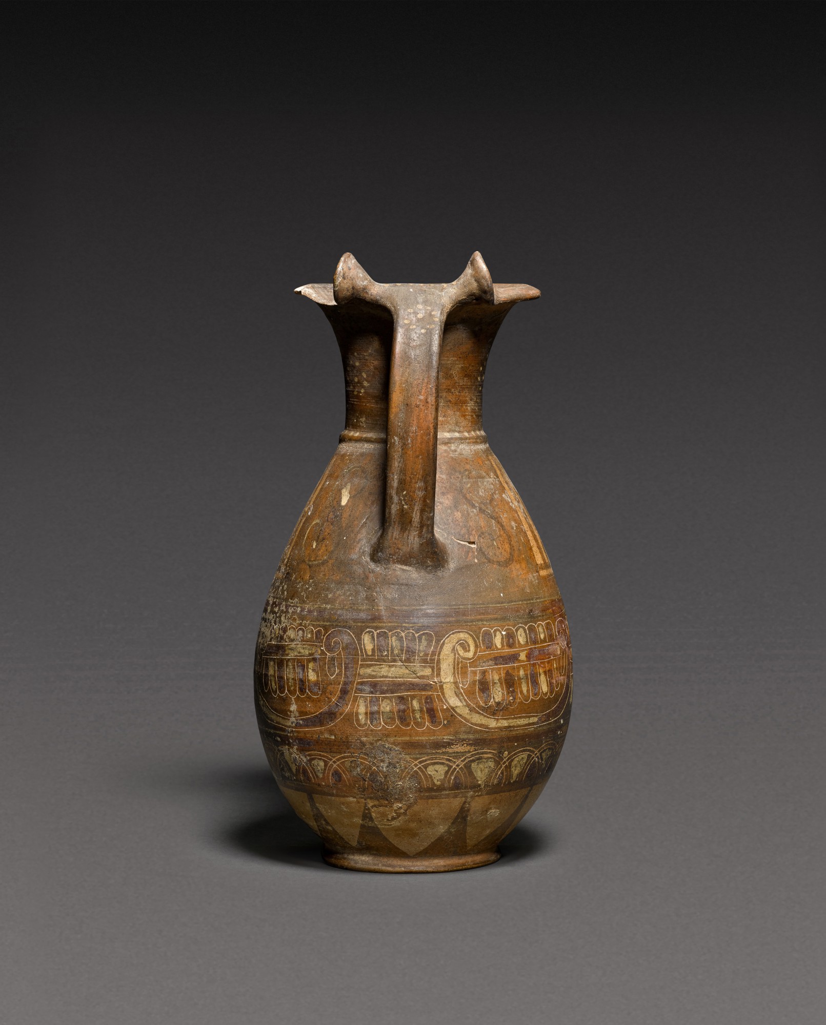 An Etrusco-Corinthian Black-figured Pottery Olpe, attributed to the ...