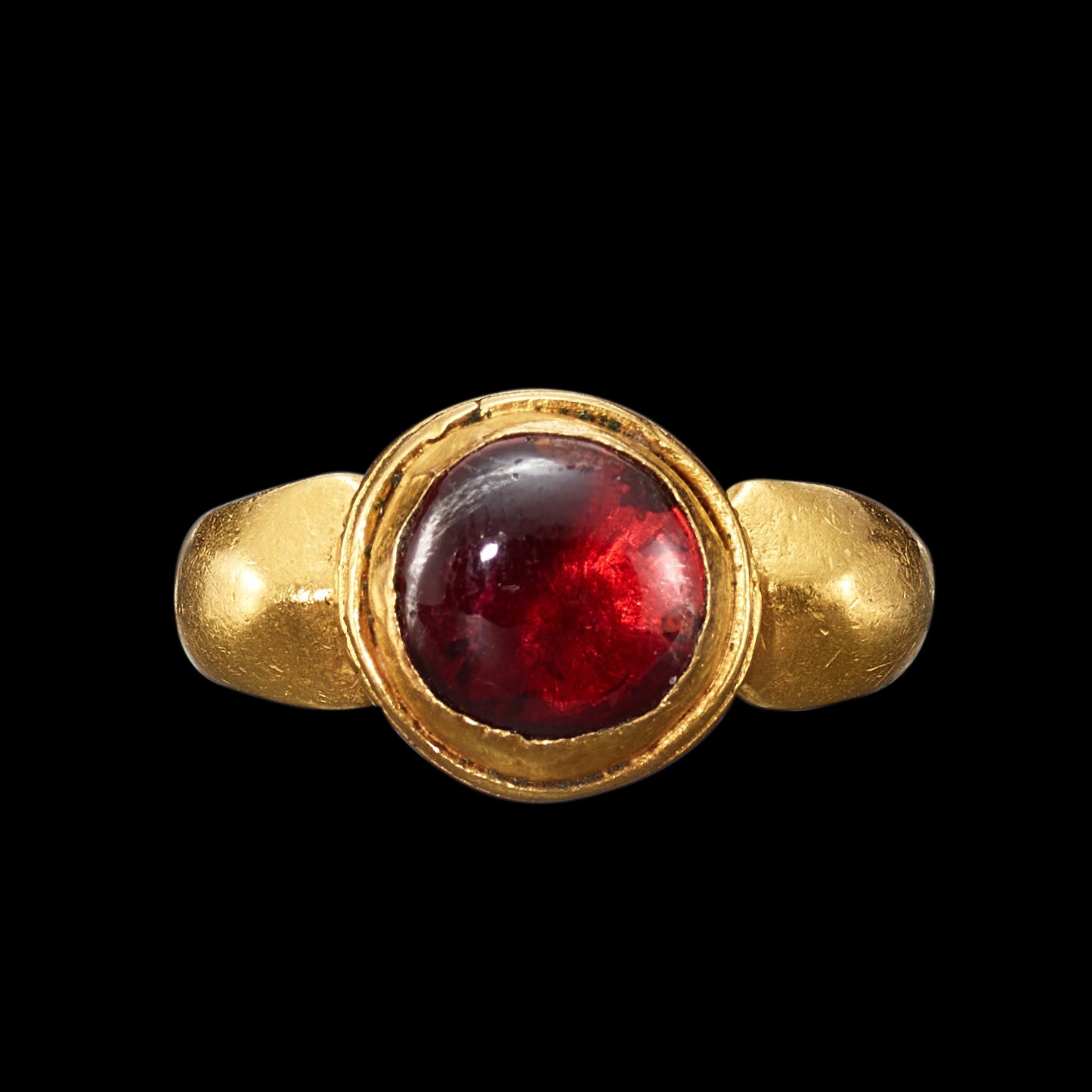 A gold and garnet cabochon ring Java, Indonesia, 7th - 12th century ...