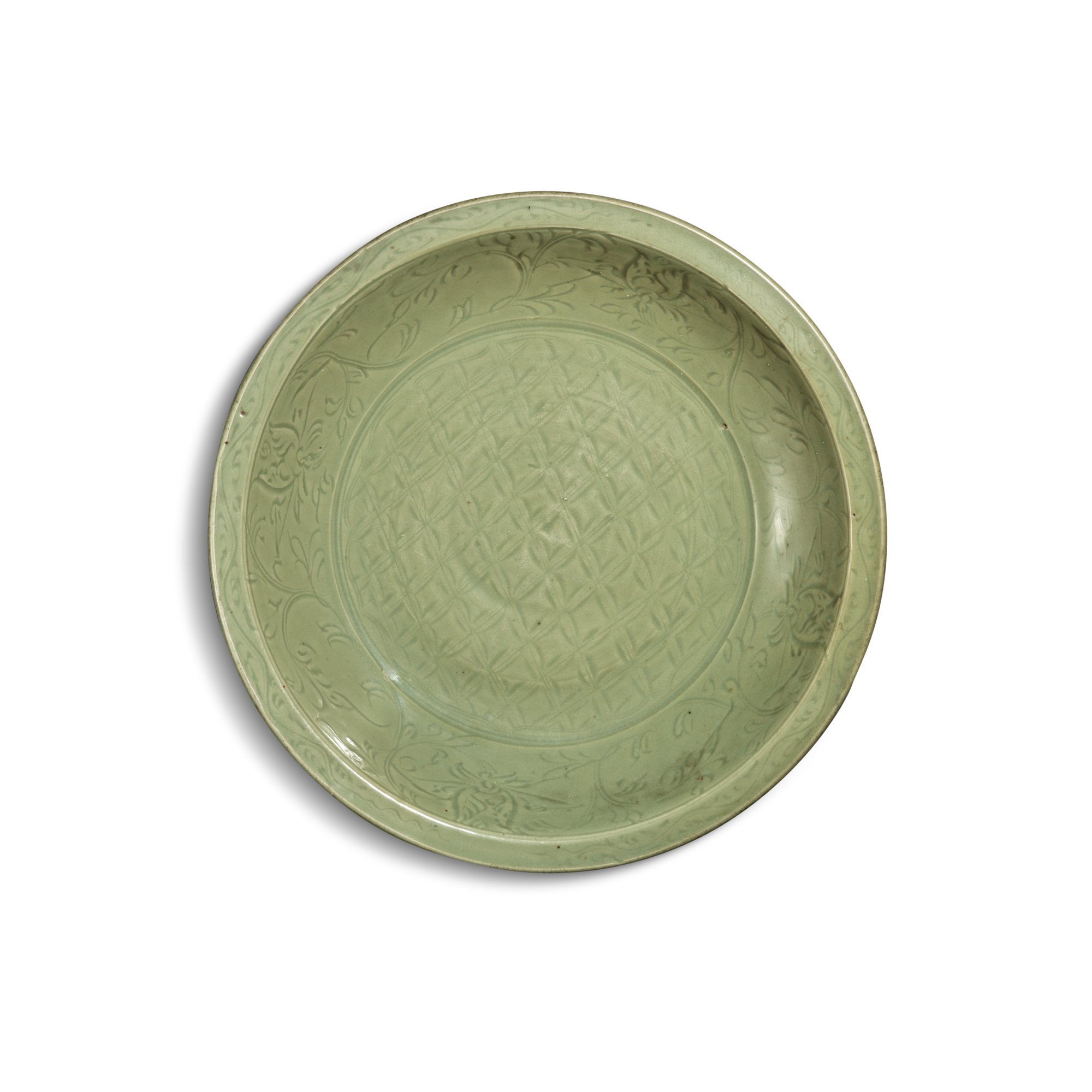 A large carved ‘Longquan’ celadon-glazed charger, Ming dynasty, 15th century | 明十五世紀 ...