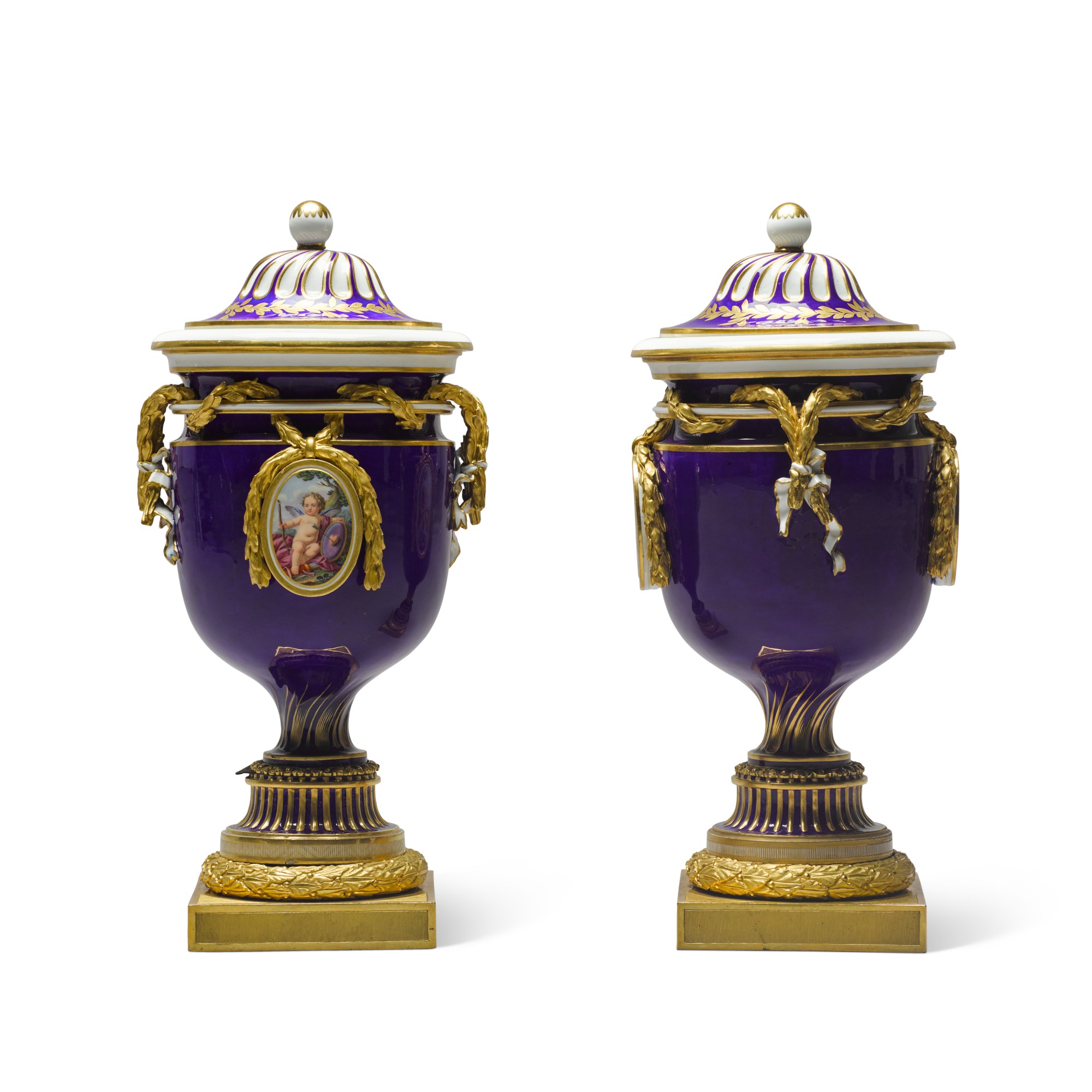 A pair of Sèvres gilt-bronze mounted blue nouveau vases and covers ...