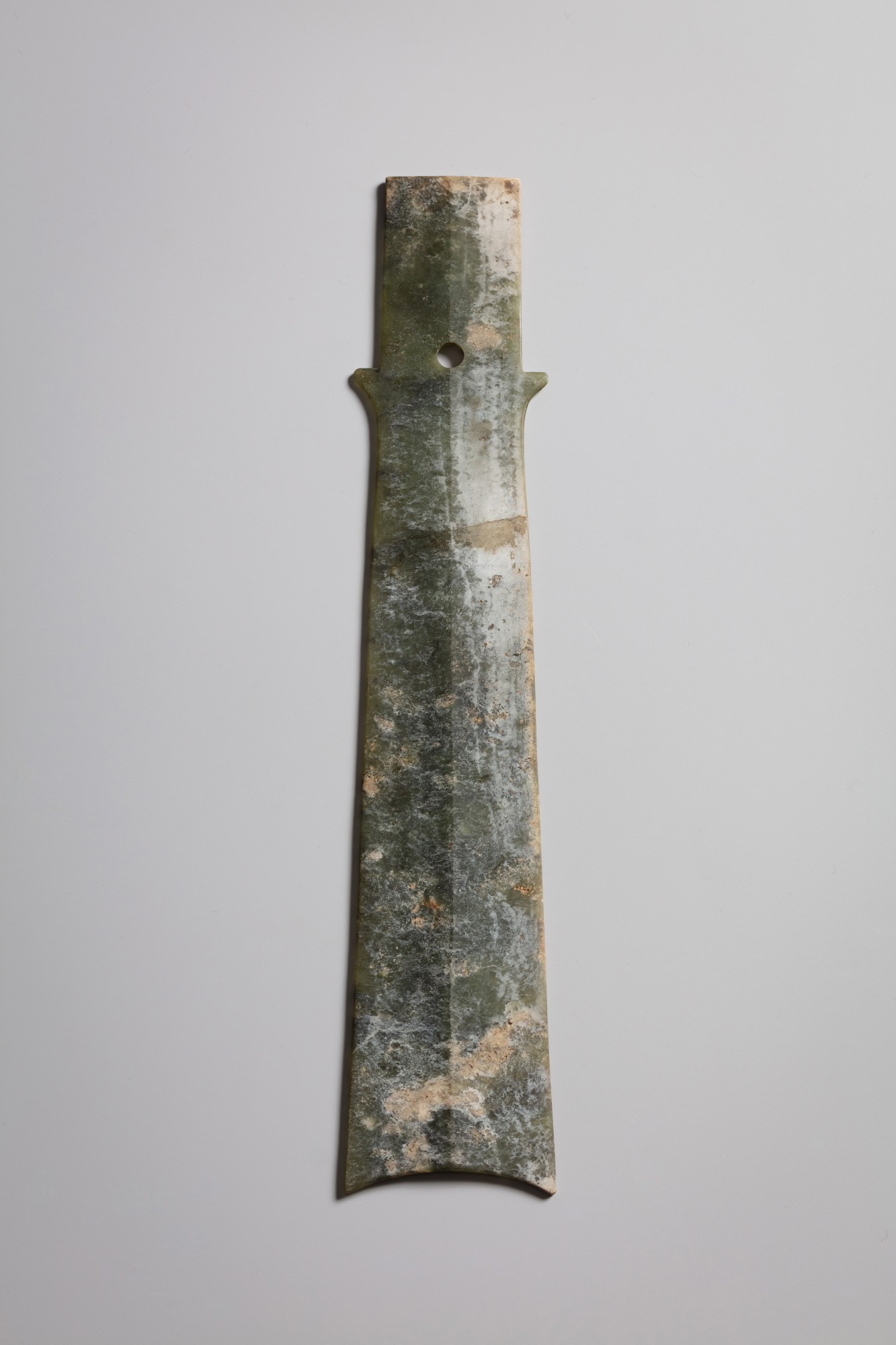 A rare large archaic green jade ceremonial blade, yazhang, Neolithic ...