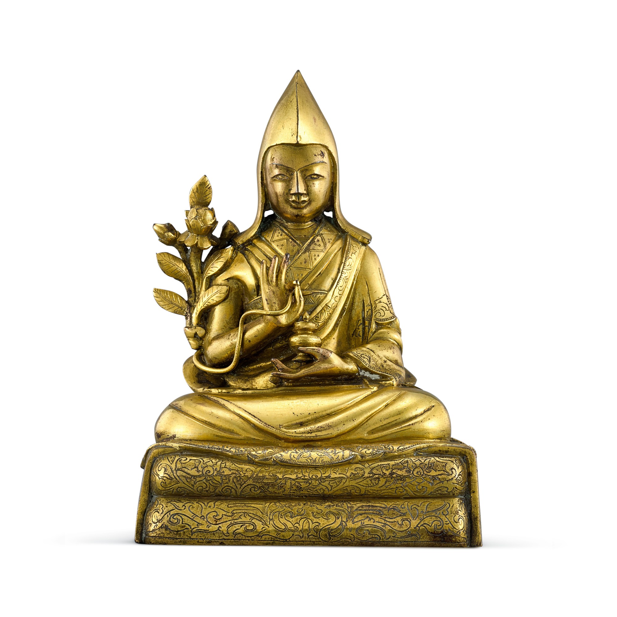 A Sino-Tibetan gilt-bronze figure of a lama, 18th century 十八世紀 漢藏鎏金銅喇嘛坐 ...