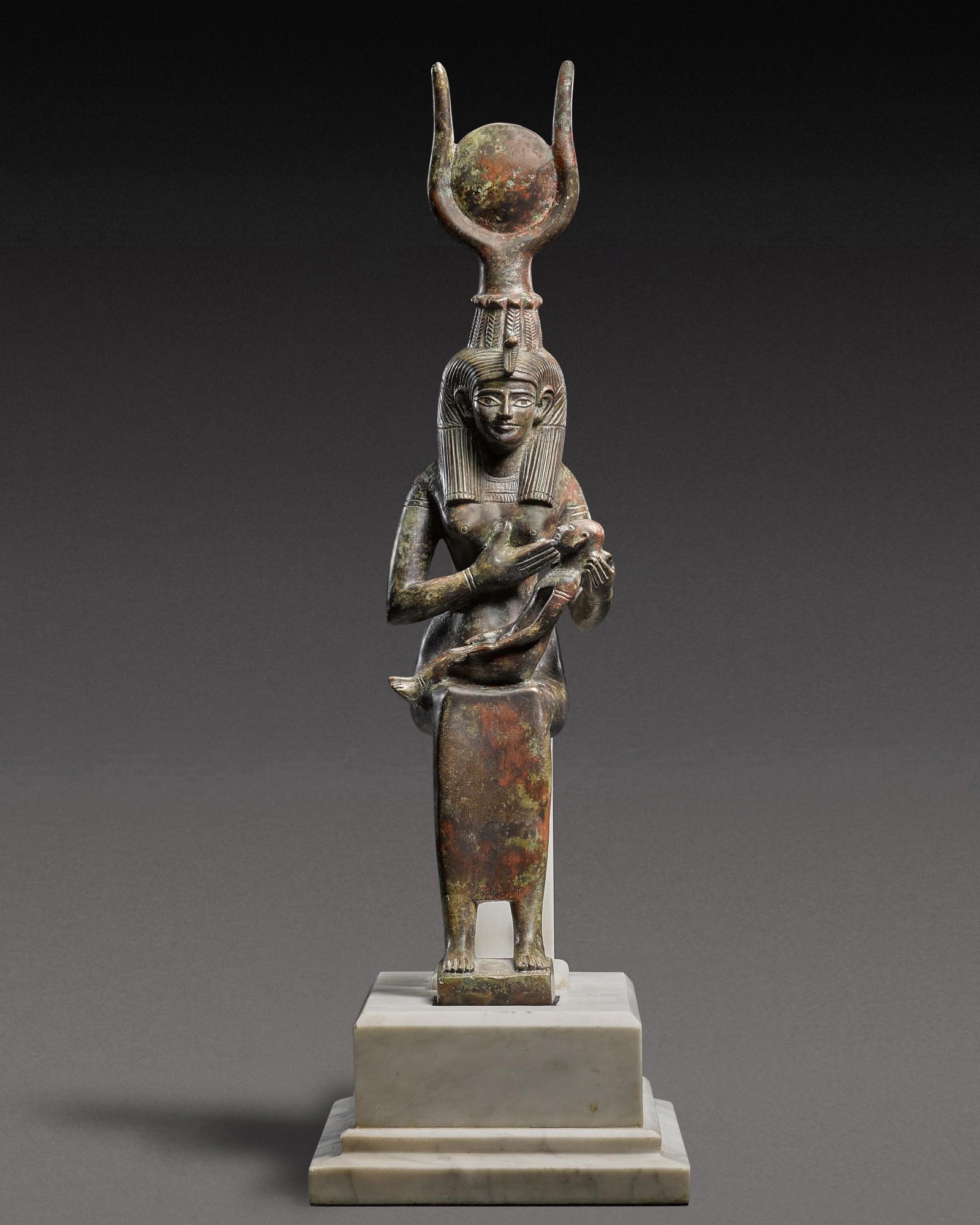 A Large Egyptian Bronze Figure of Isis with Horus, 25th/26th Dynasty ...