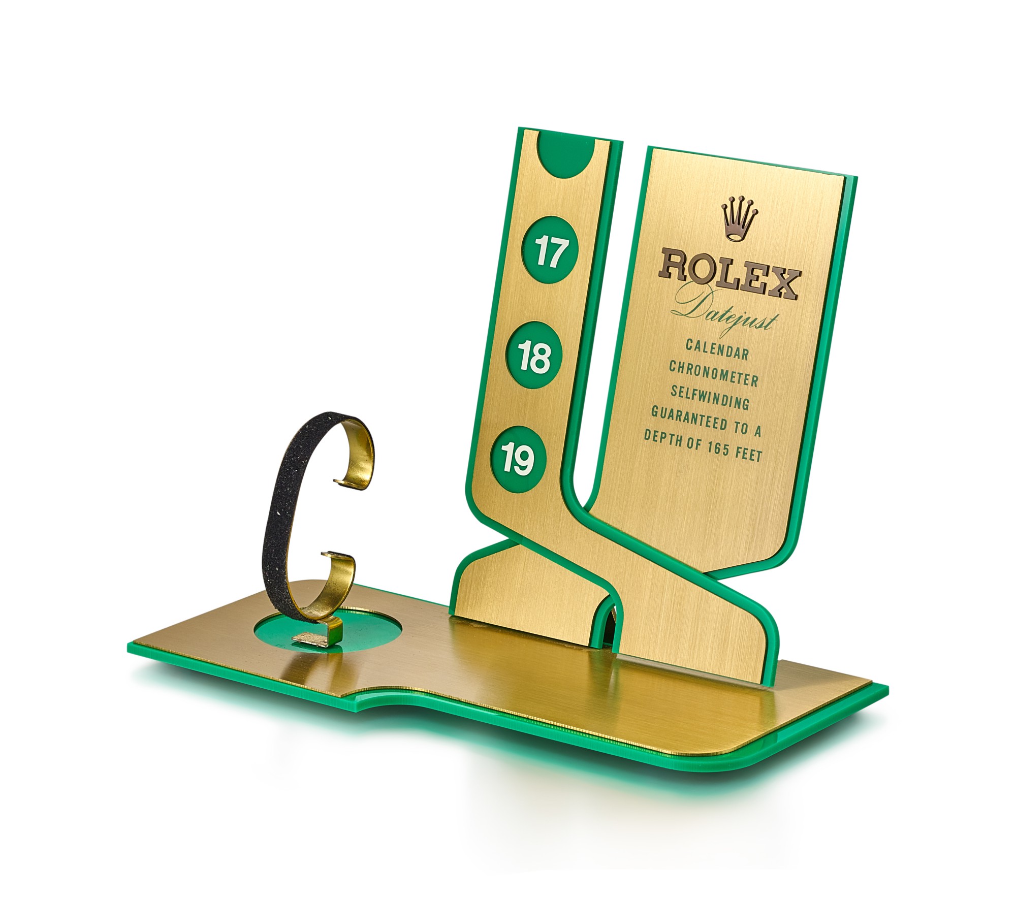ROLEX | A GILT BRASS, GREEN ENAMEL AND PLASTIC RETAILER'S WINDOW ...